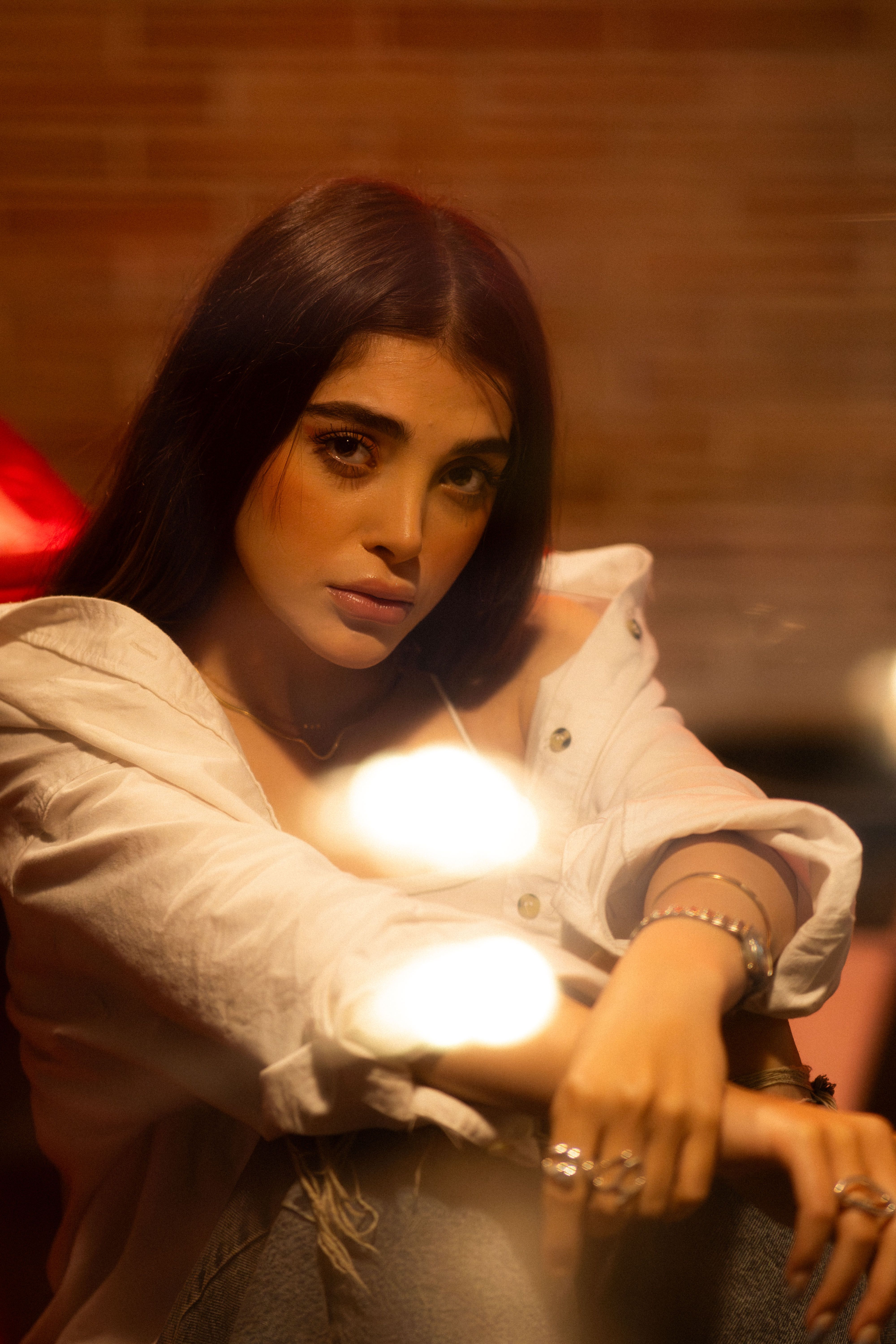 Portrait of a Woman in Warm Lighting Setting · Free Stock Photo