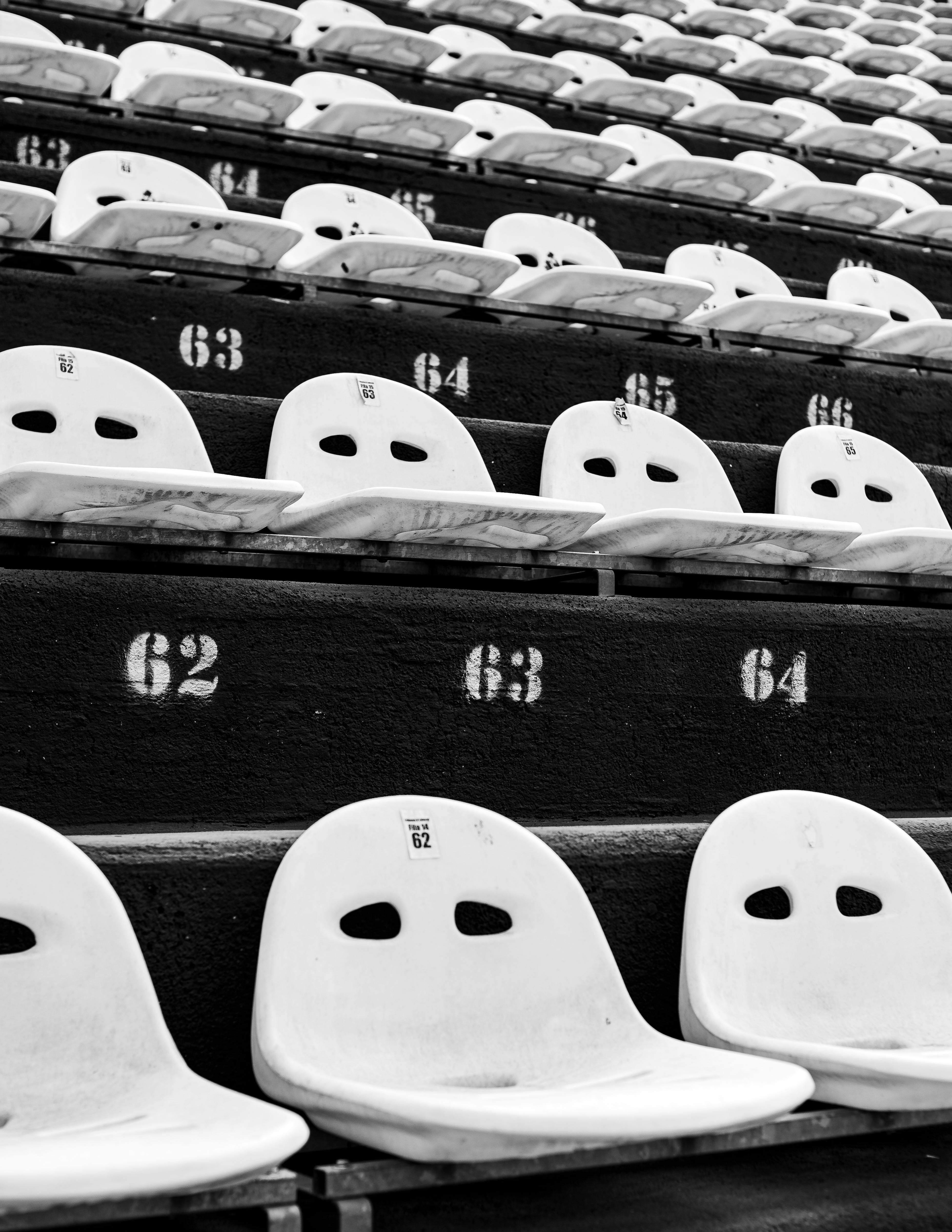 Black and White Stadium Seating Rows Perspective · Free Stock Photo