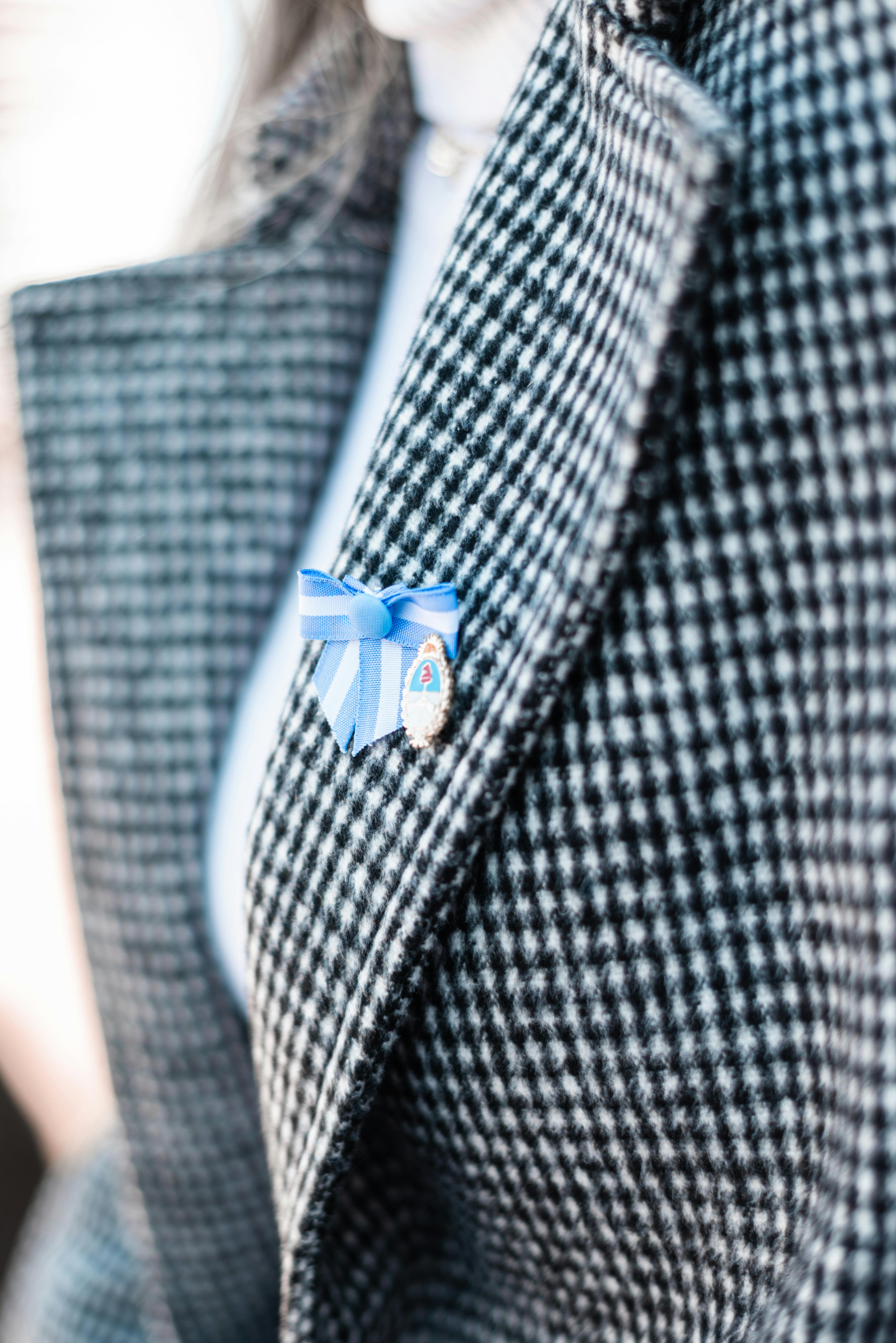 Hand Touching Moth Shaped Pin · Free Stock Photo