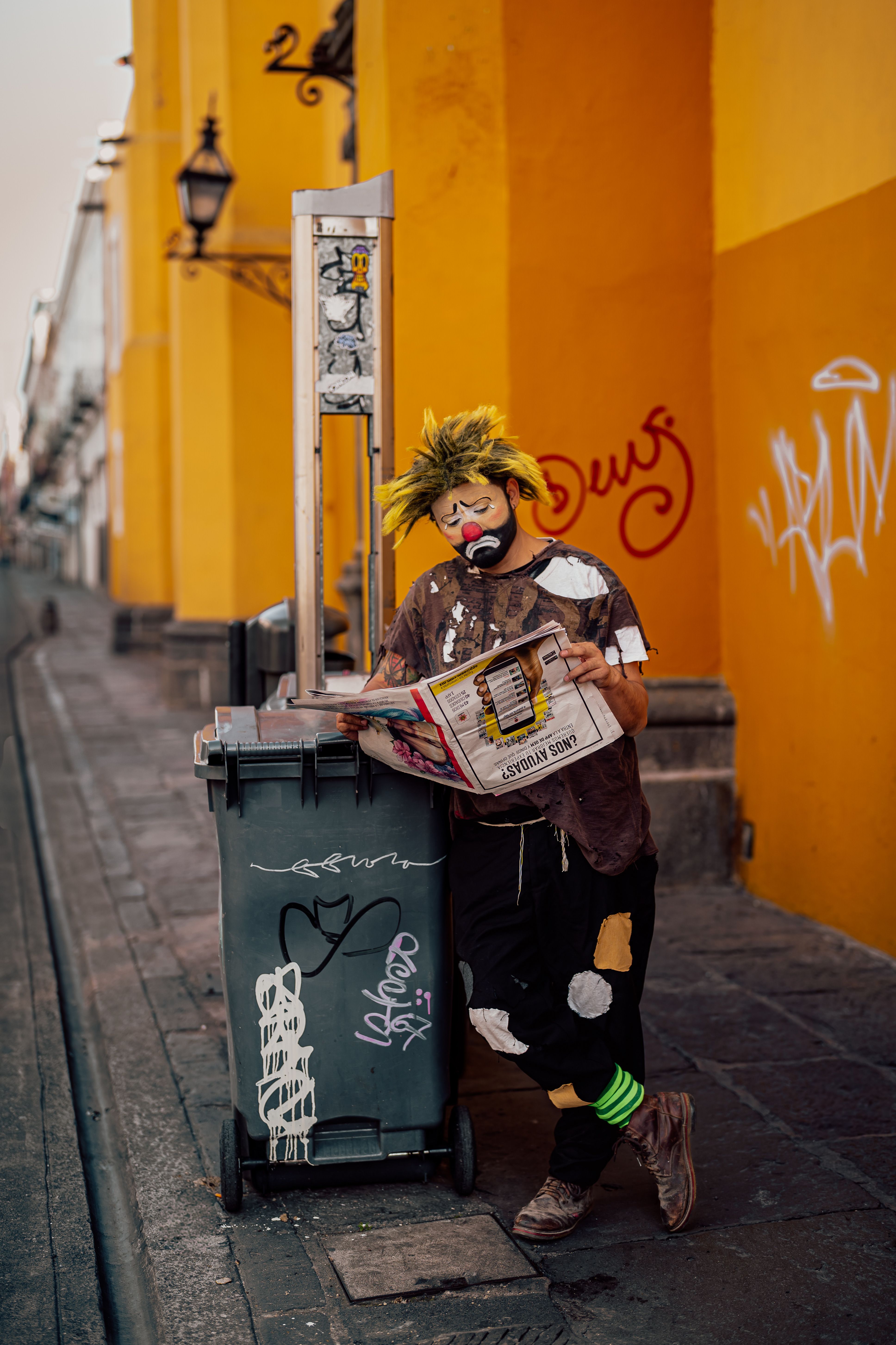 Street Performer Clown with Trash Bin in Mexico · Free Stock Photo