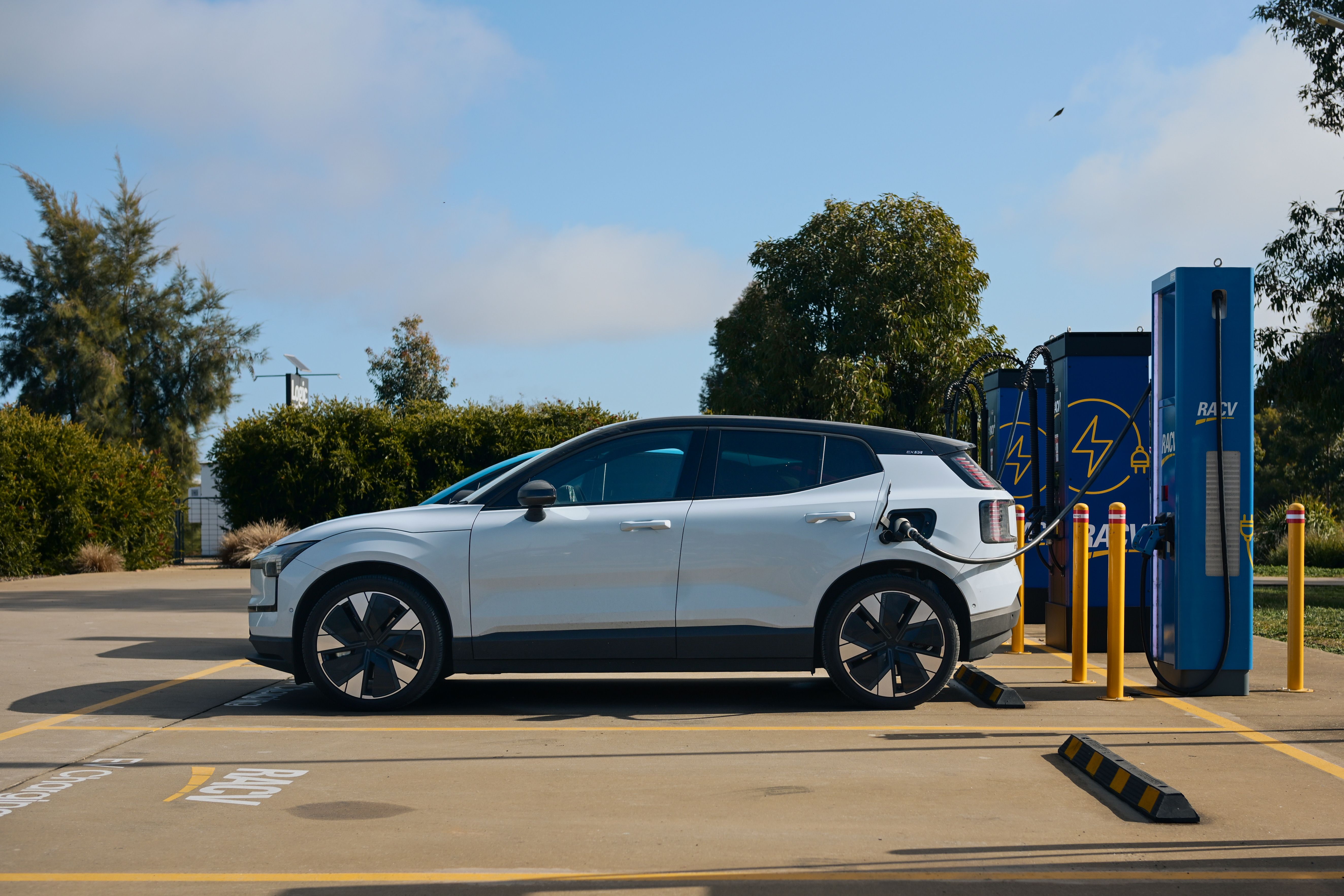 Electric Car Charging at Station in Australia · Free Stock Photo
