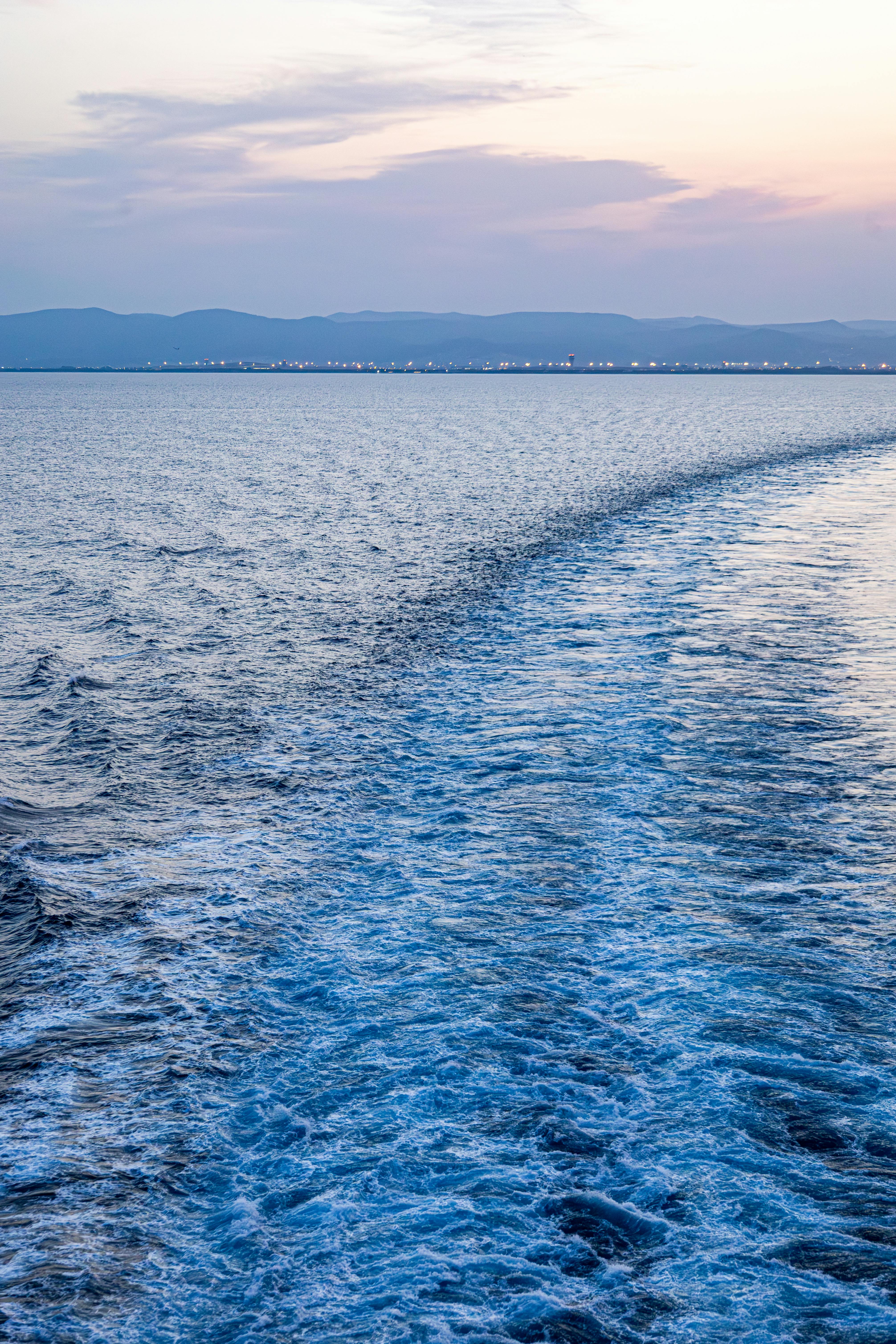 Serene Ocean Waves at Sunset from a Cruise Ship · Free Stock Photo