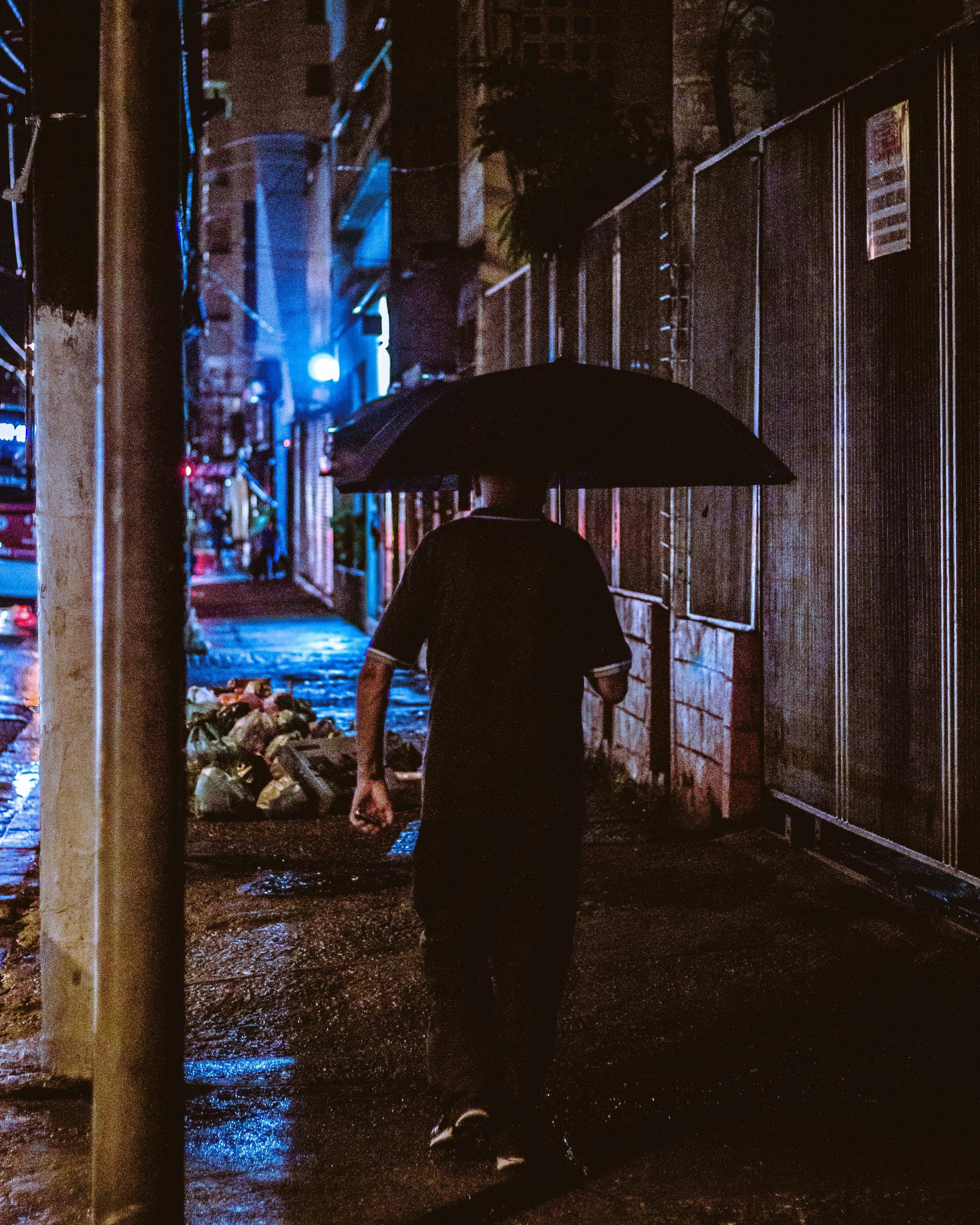 Man Holding Umbrella · Free Stock Photo