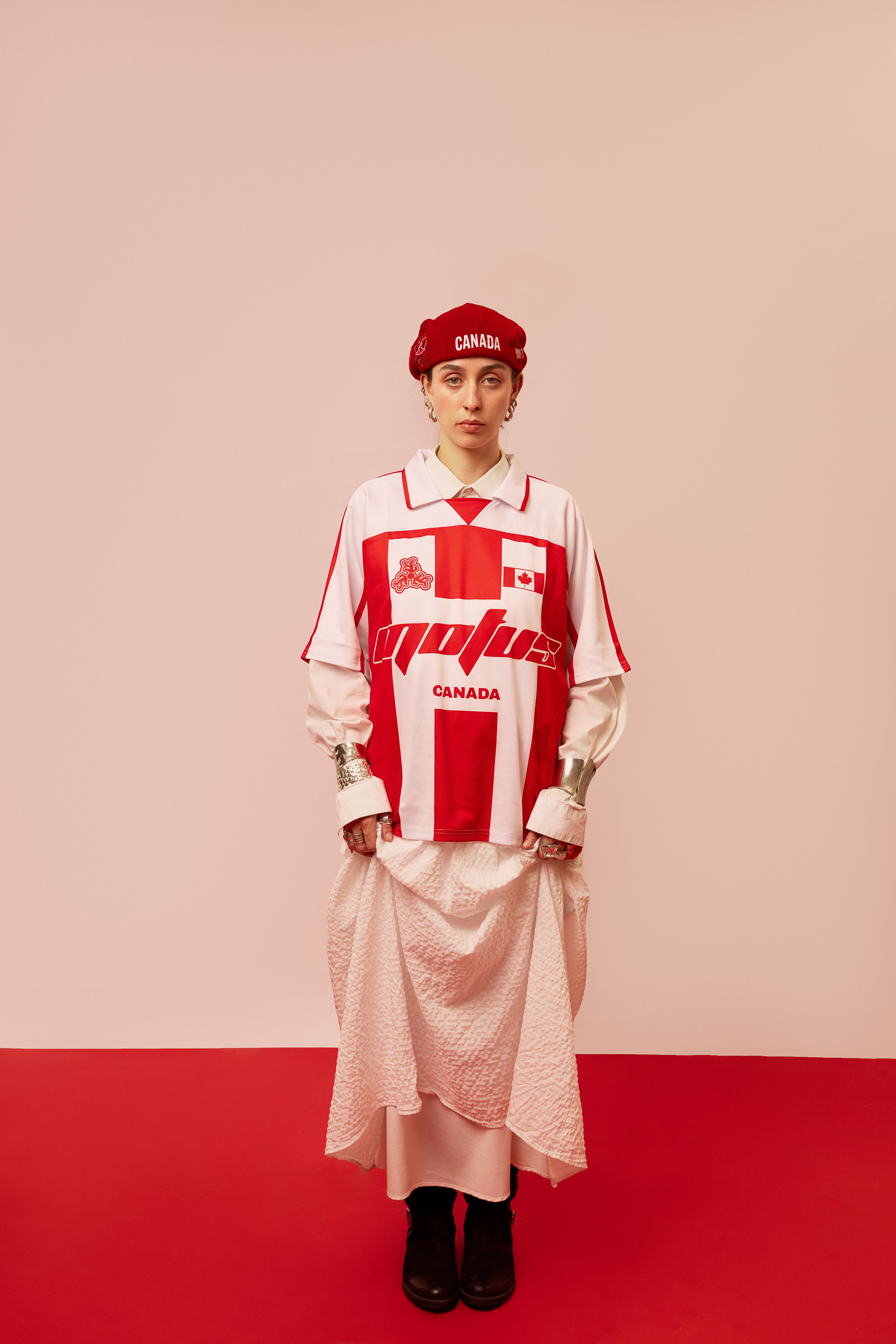 Fashion Model in Canadian Flag-Themed Outfit · Free Stock Photo