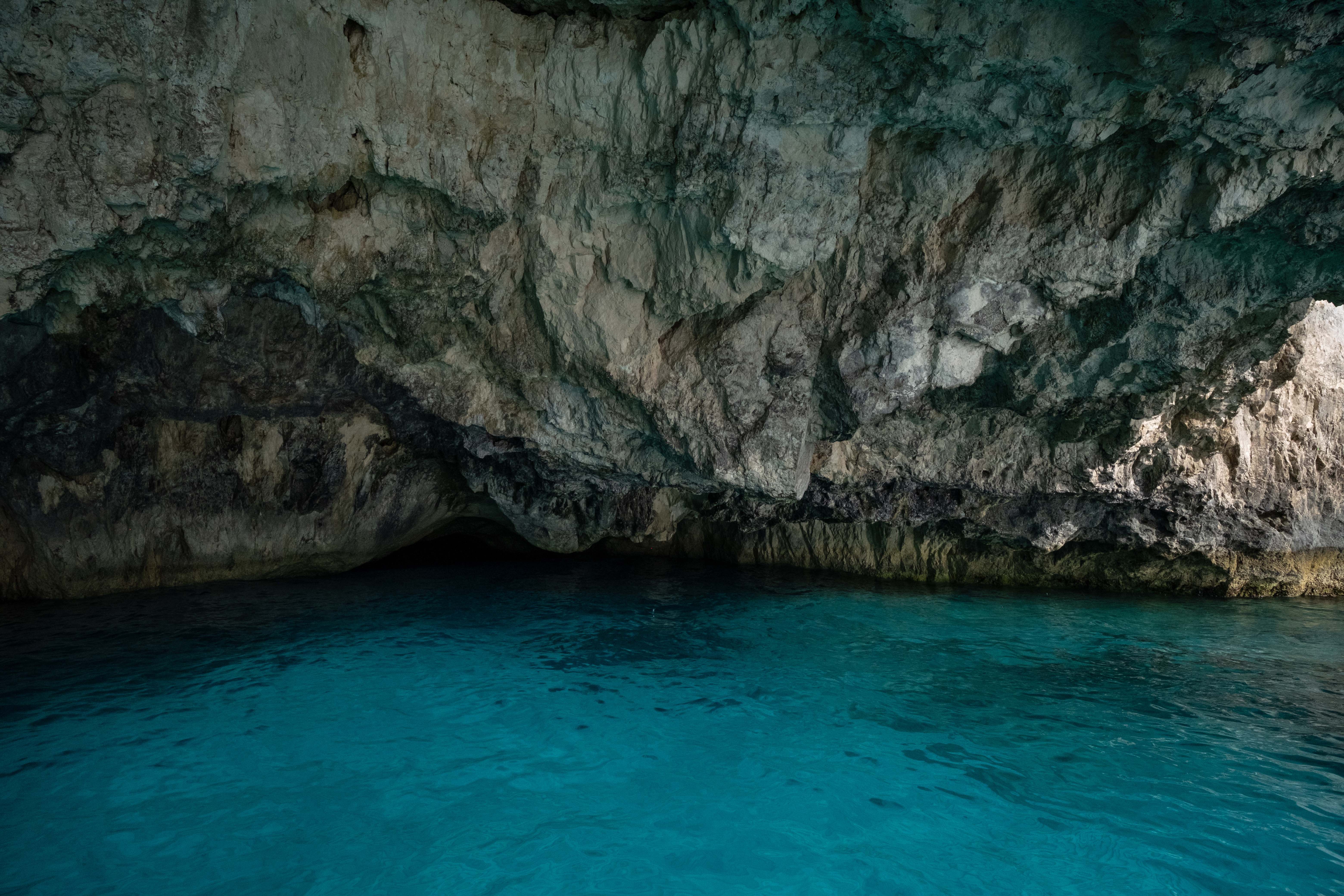 Scenic View Inside a Natural Sea Cave · Free Stock Photo