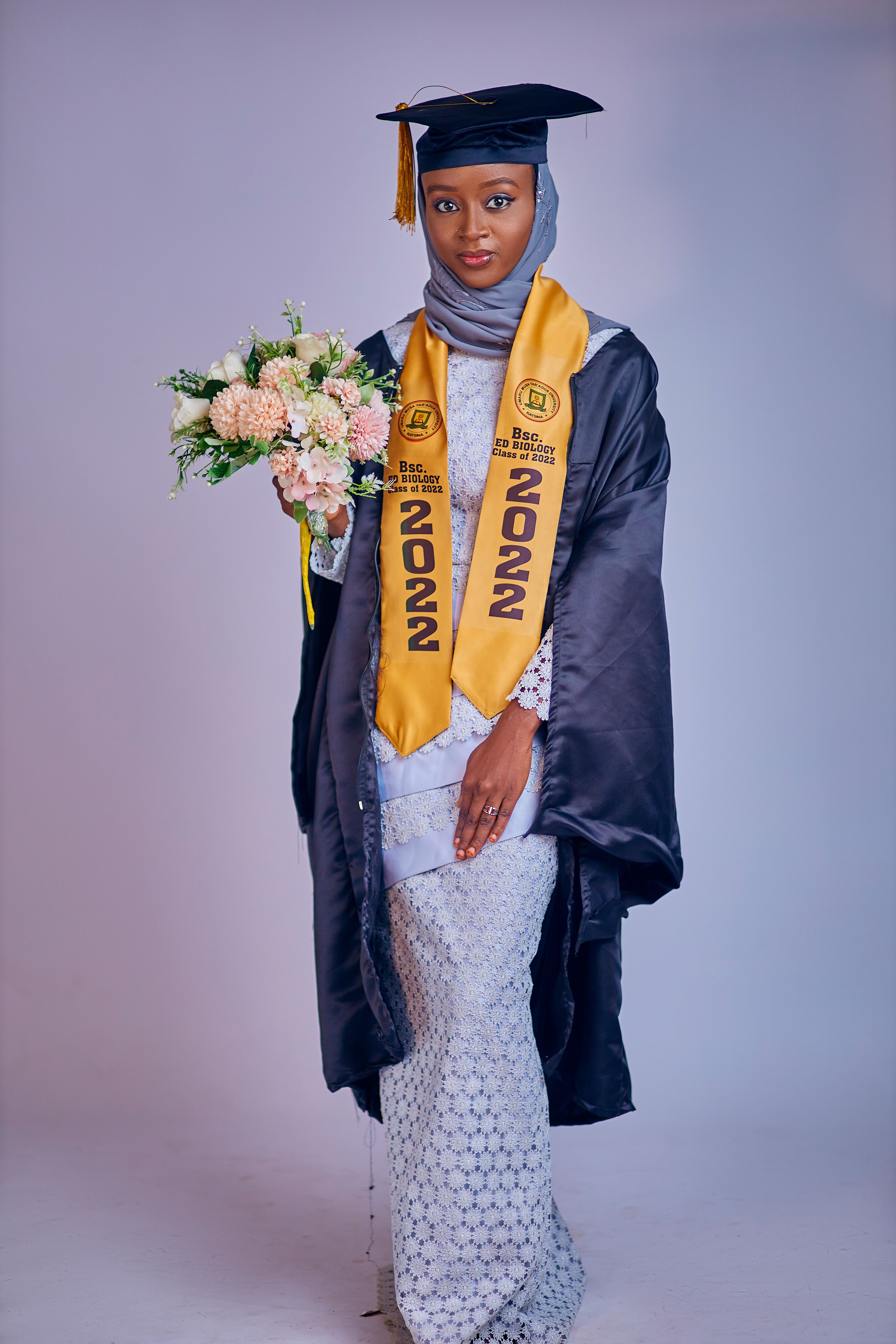 African Woman Celebrates Graduation with Diploma · Free Stock Photo