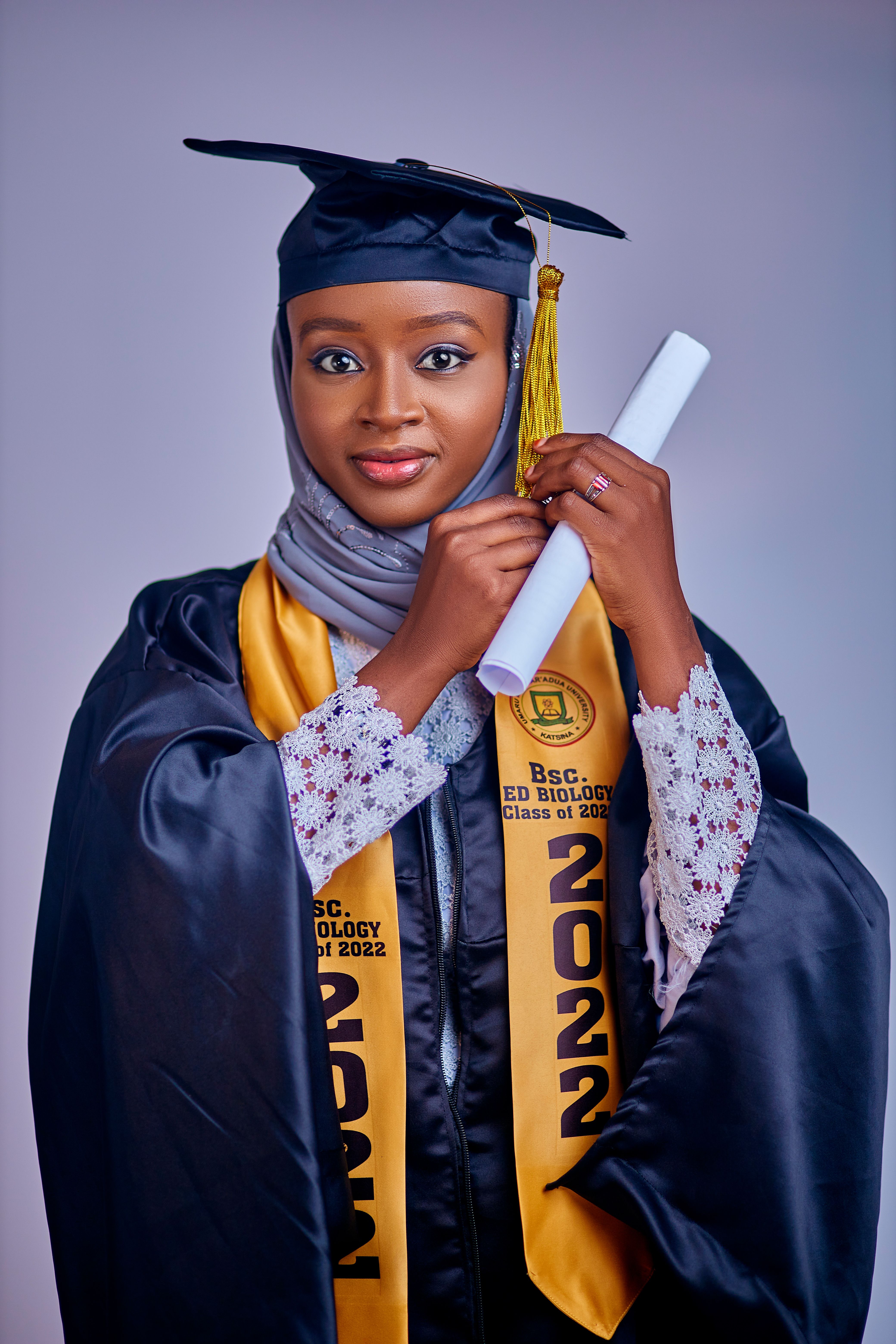 African Woman Celebrates Graduation with Diploma · Free Stock Photo