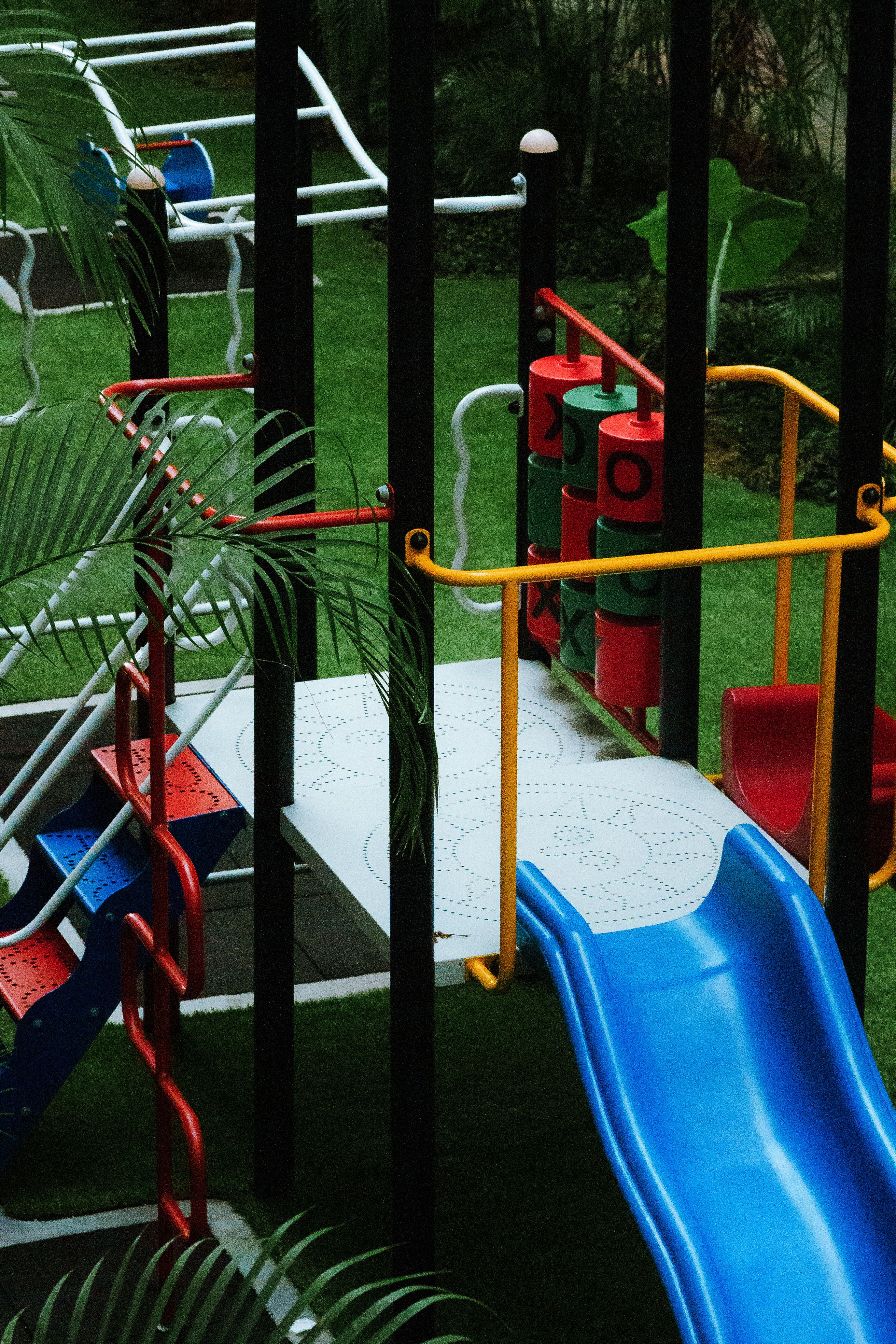 Bright and Colorful Playground Slide in Park · Free Stock Photo