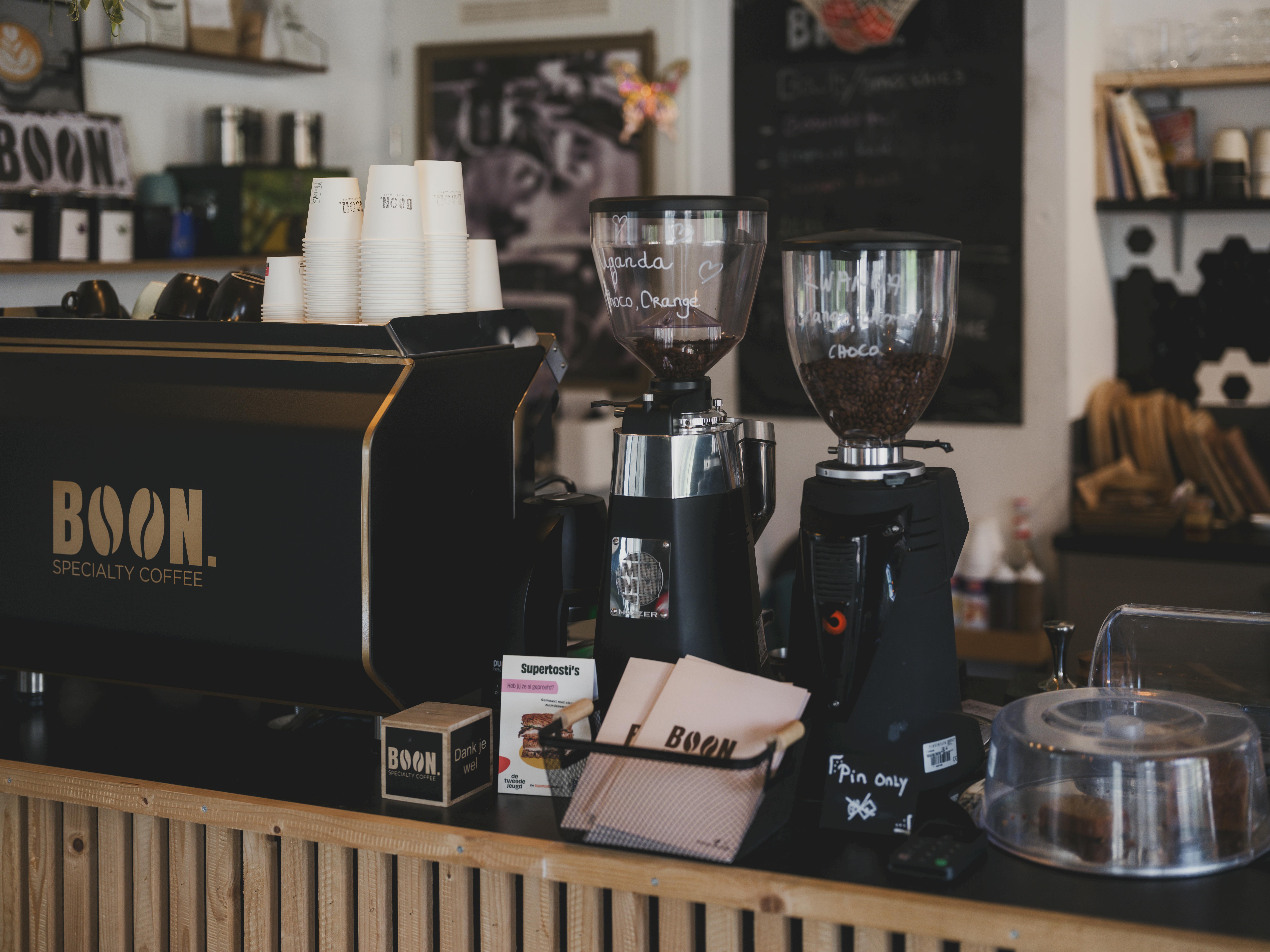 Cozy Coffee Shop with Espresso Machines and Accessories · Free Stock Photo