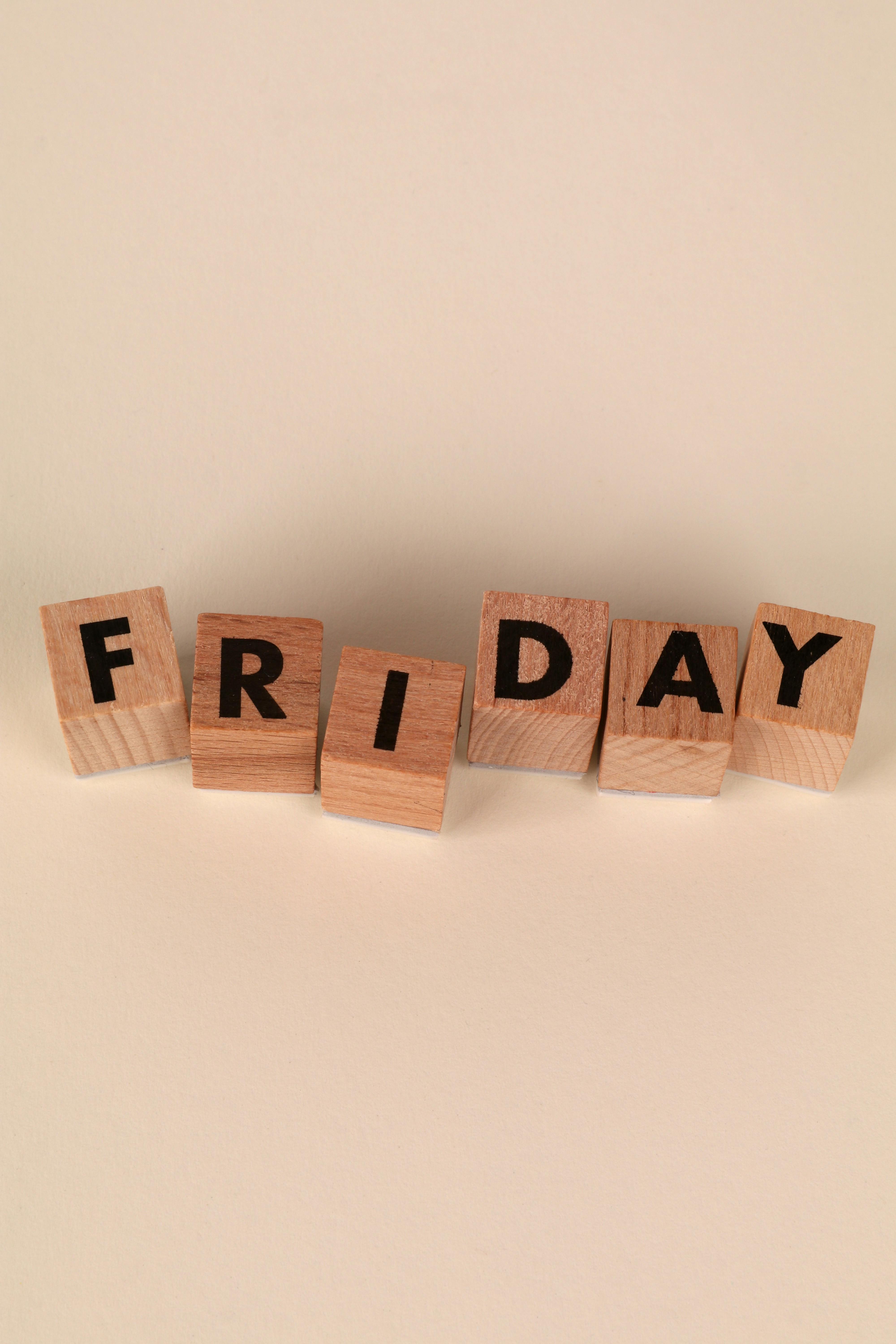 Free Wooden blocks arranged to spell 'Friday', perfect for weekend and ...