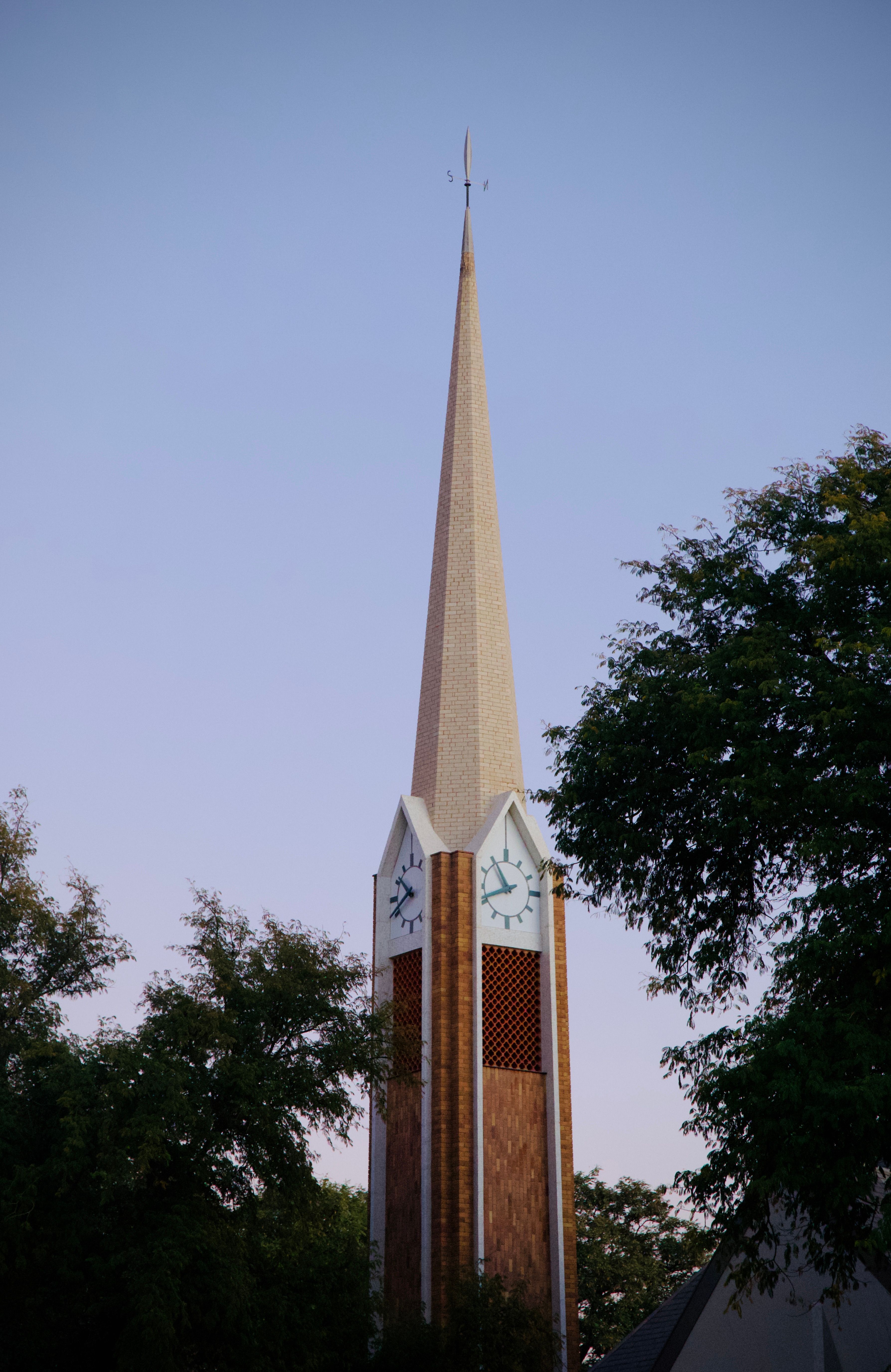 Tall Church Steeple Against Sunset Sky · Free Stock Photo