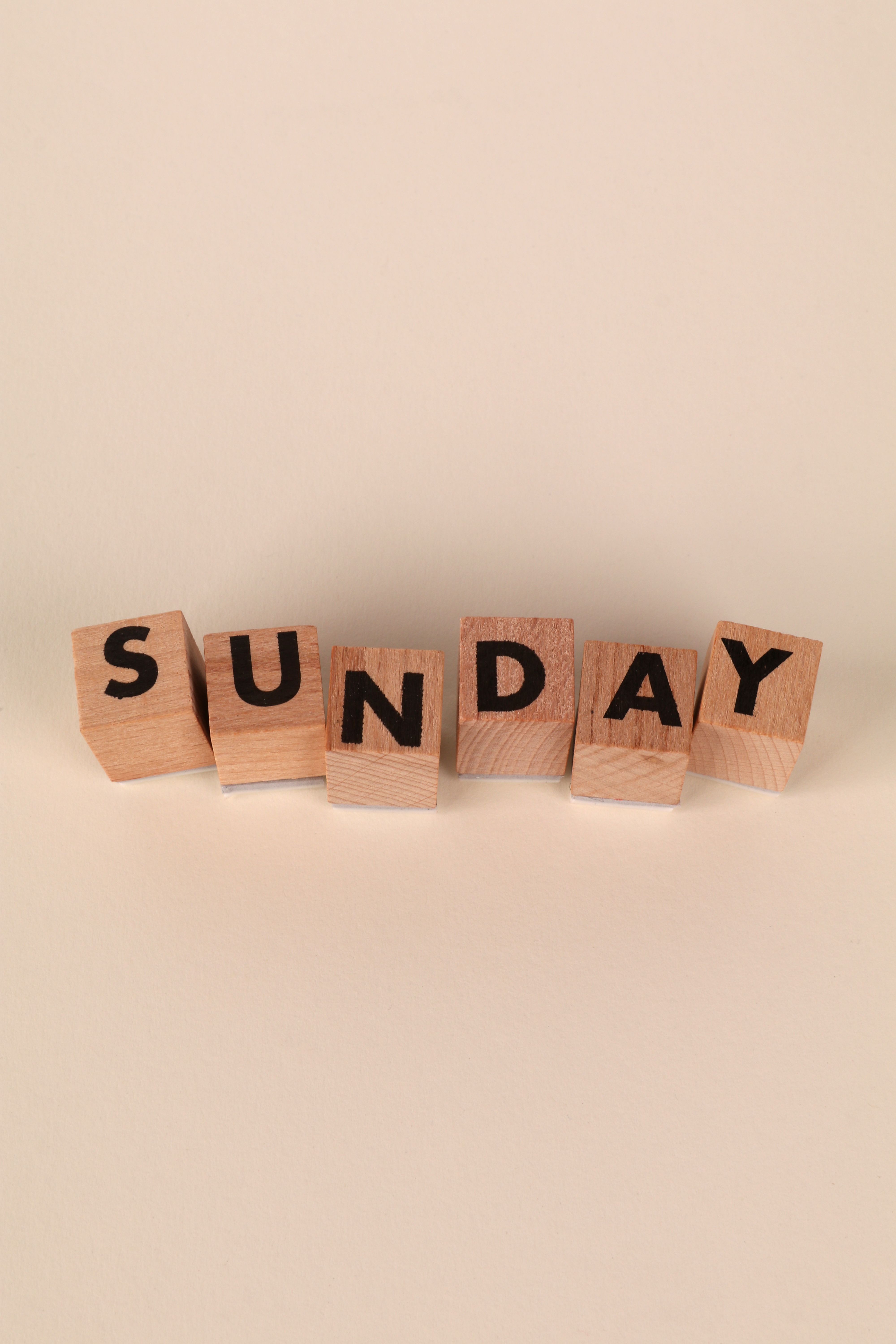 Wooden Blocks Spelling Sunday on Neutral Background · Free Stock Photo