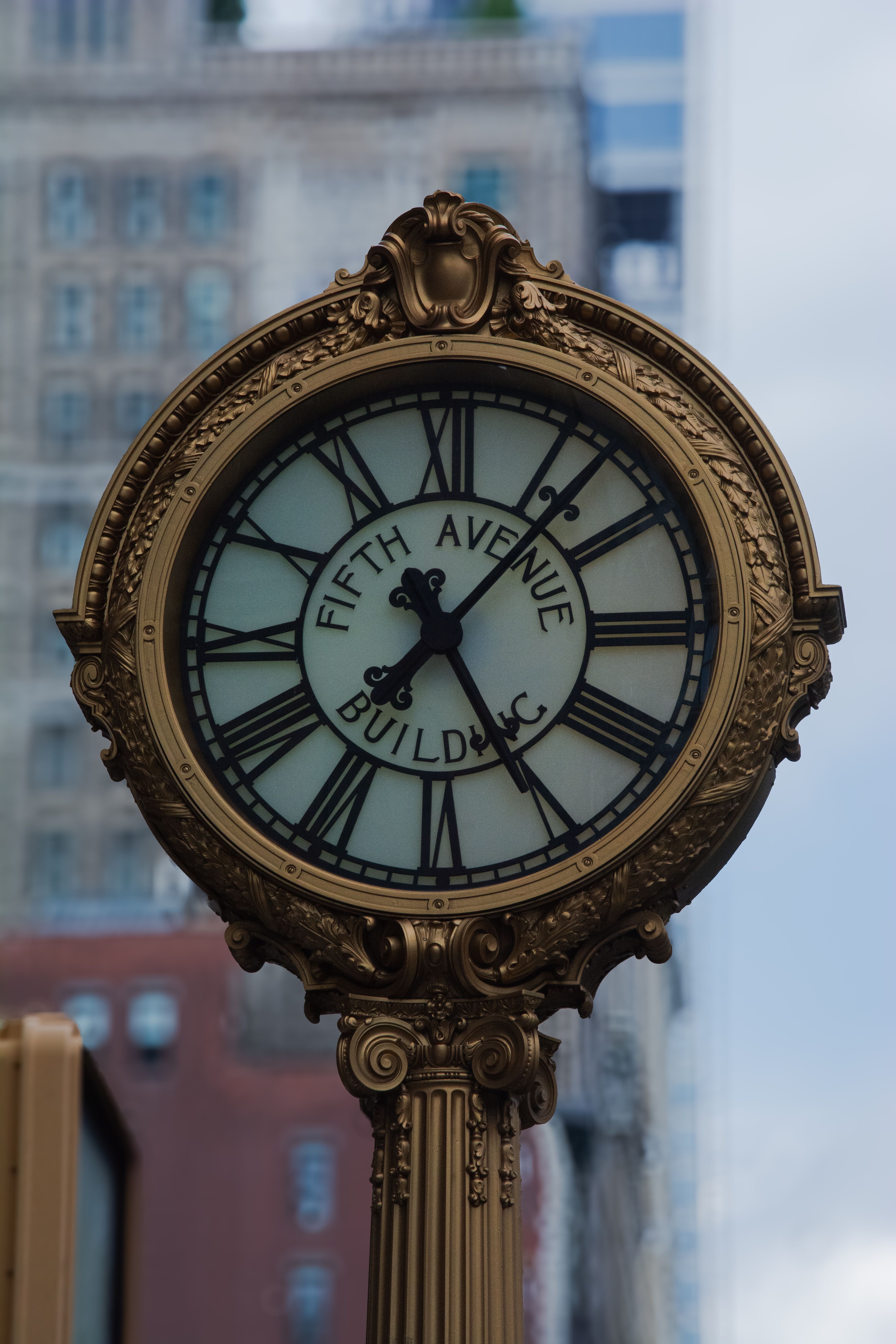 Vintage Fifth Avenue Building Clock in NYC · Free Stock Photo