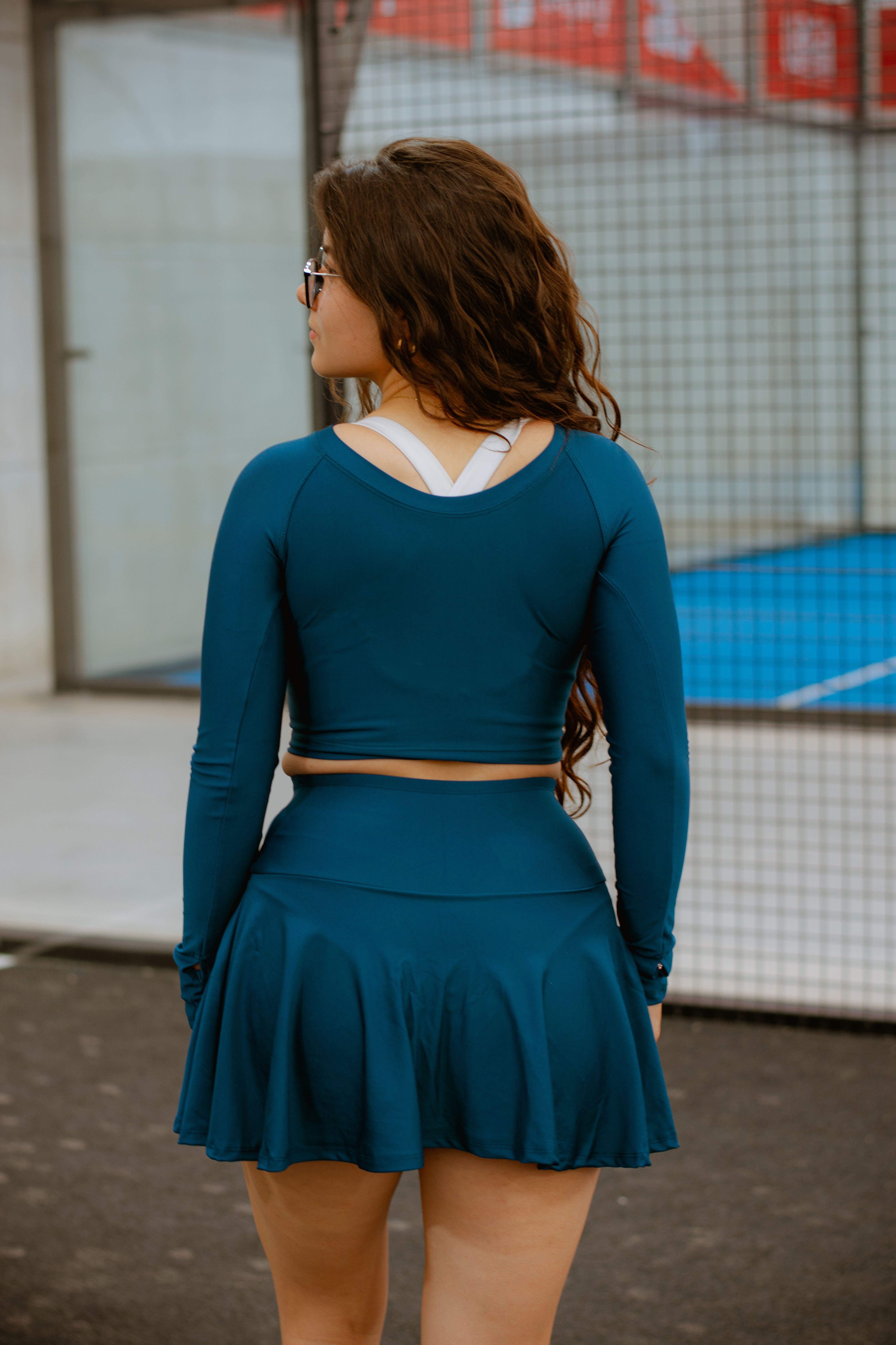 Young Woman in Blue Sports Outfit on Padel Court · Free Stock Photo