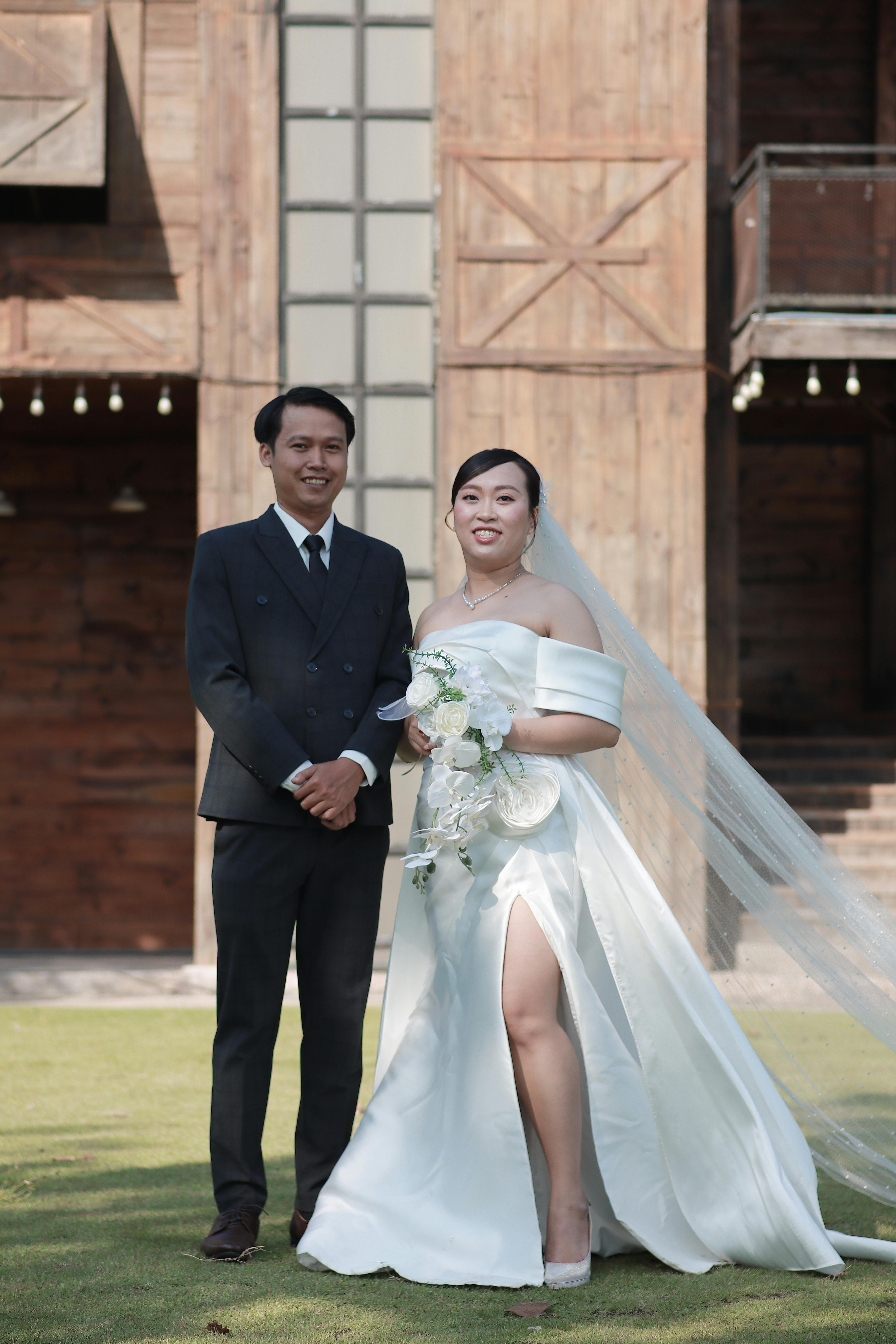 Elegant Outdoor Wedding Portrait of a Couple · Free Stock Photo