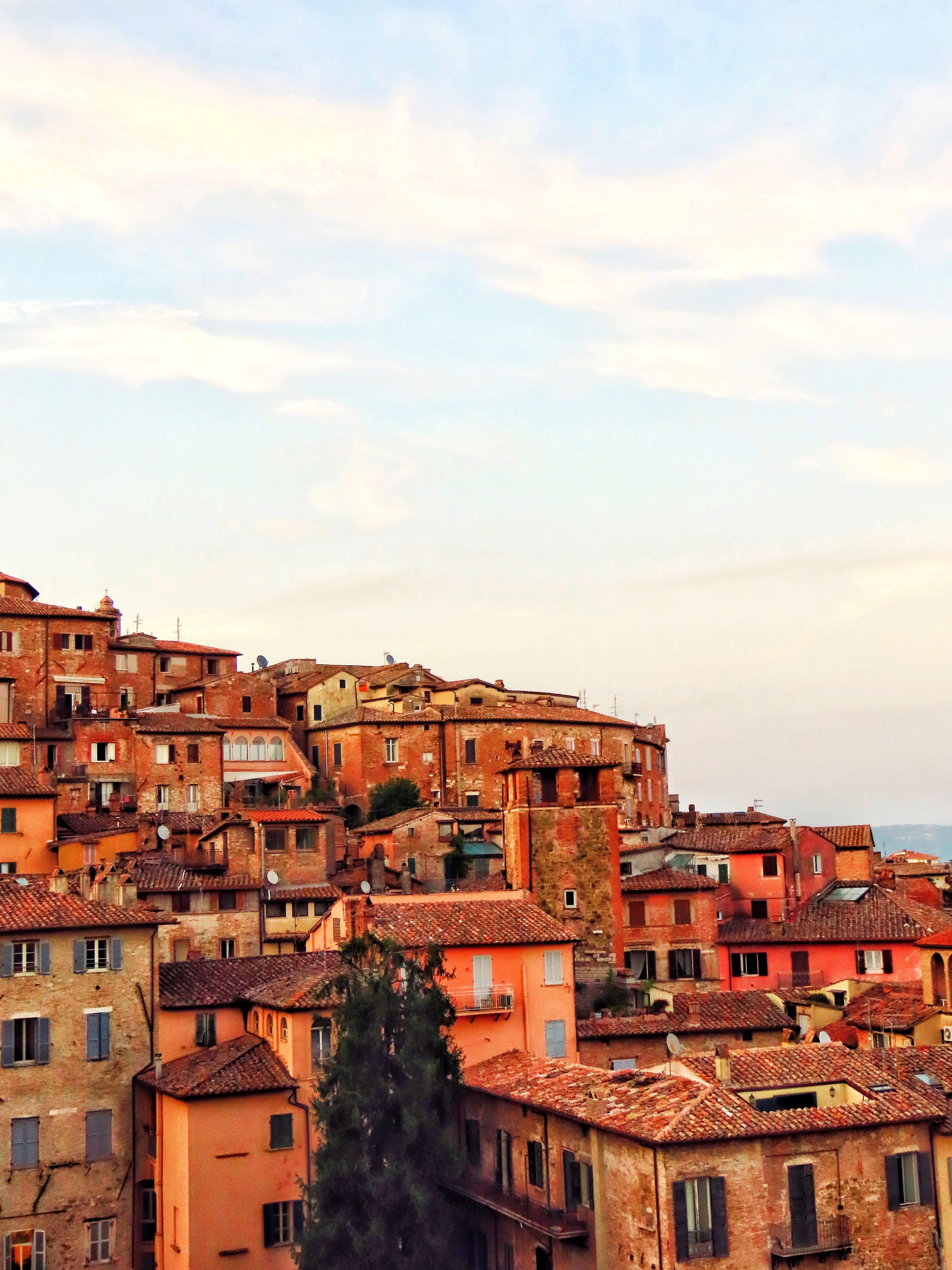 Charming Italian Rooftops Under Clear Sky · Free Stock Photo