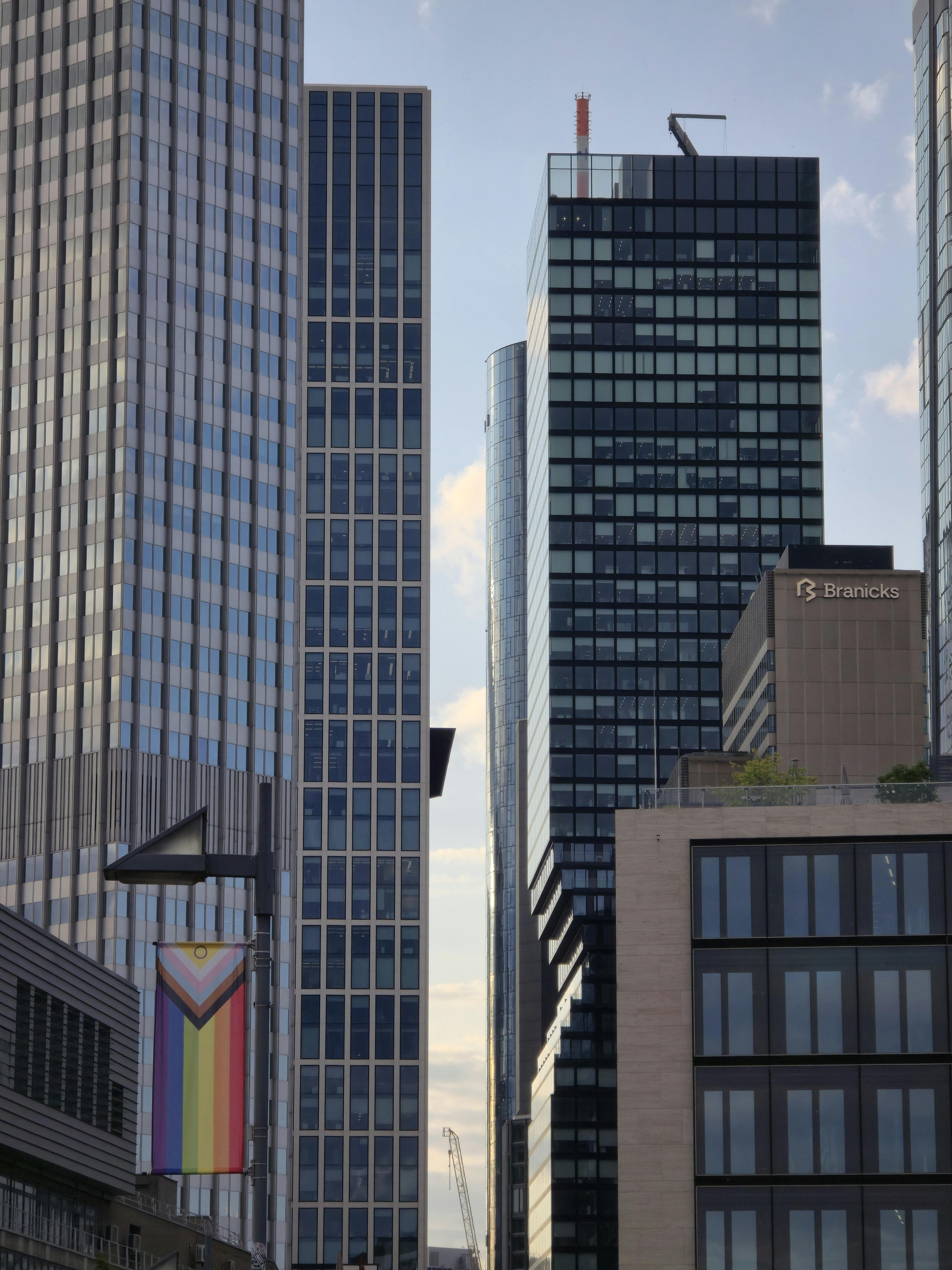 Modern Skyscrapers with LGBTQ+ Pride Banner · Free Stock Photo