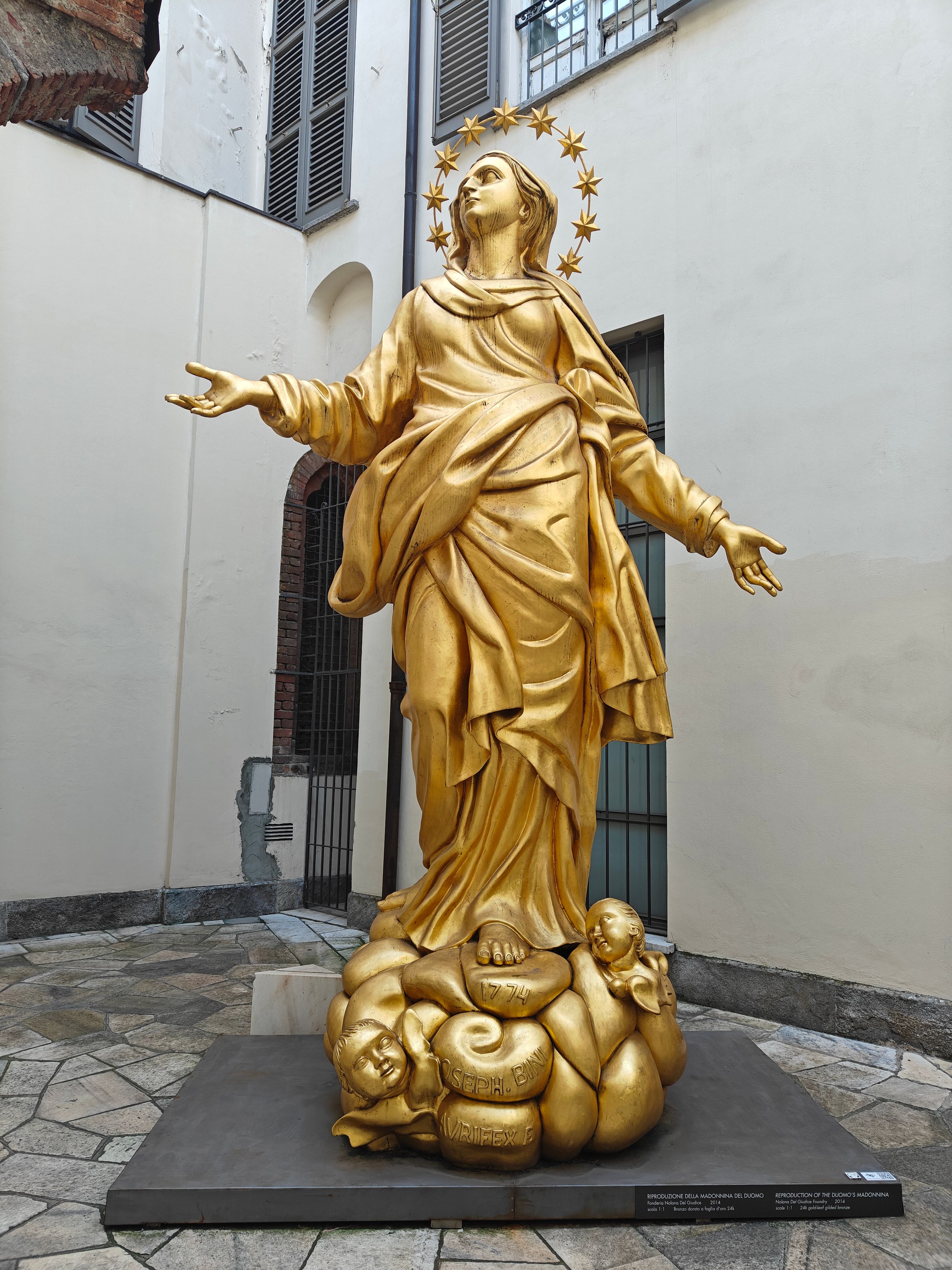 Golden Madonna Statue in Milan Courtyard · Free Stock Photo