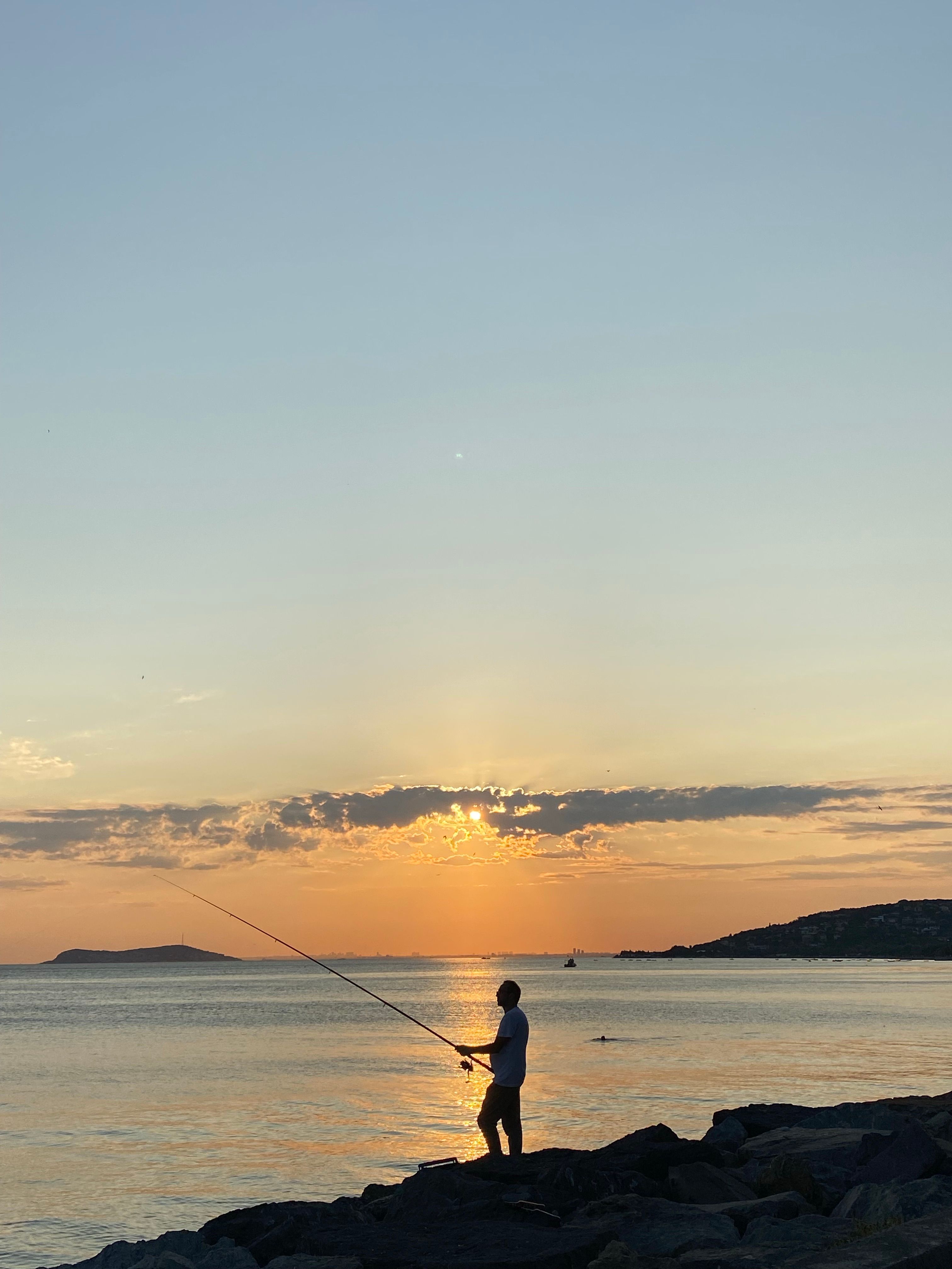 Fisherman Enjoying Sunset in İstanbul, Turkey · Free Stock Photo