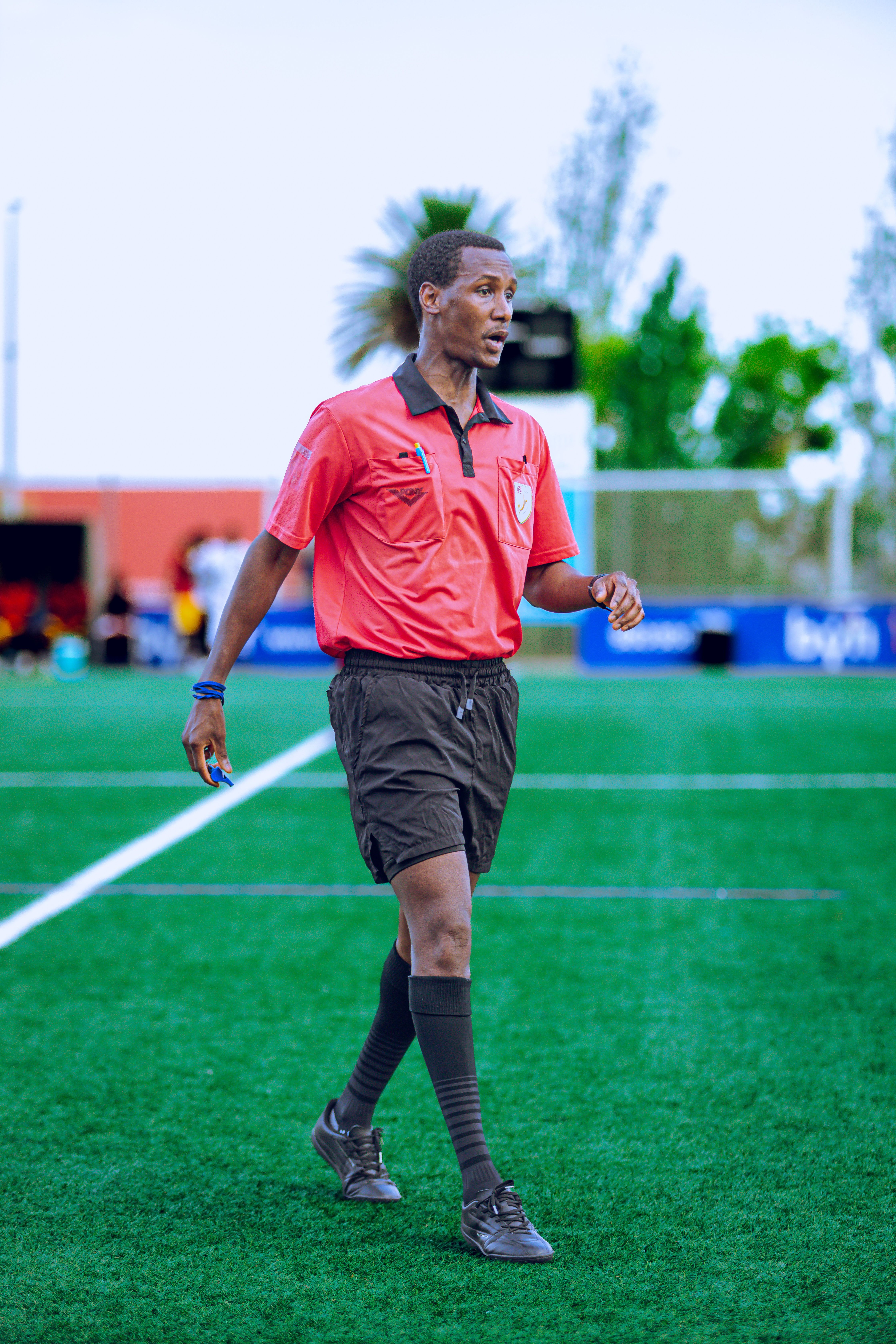 Soccer Referee on Green Field in Daylight · Free Stock Photo