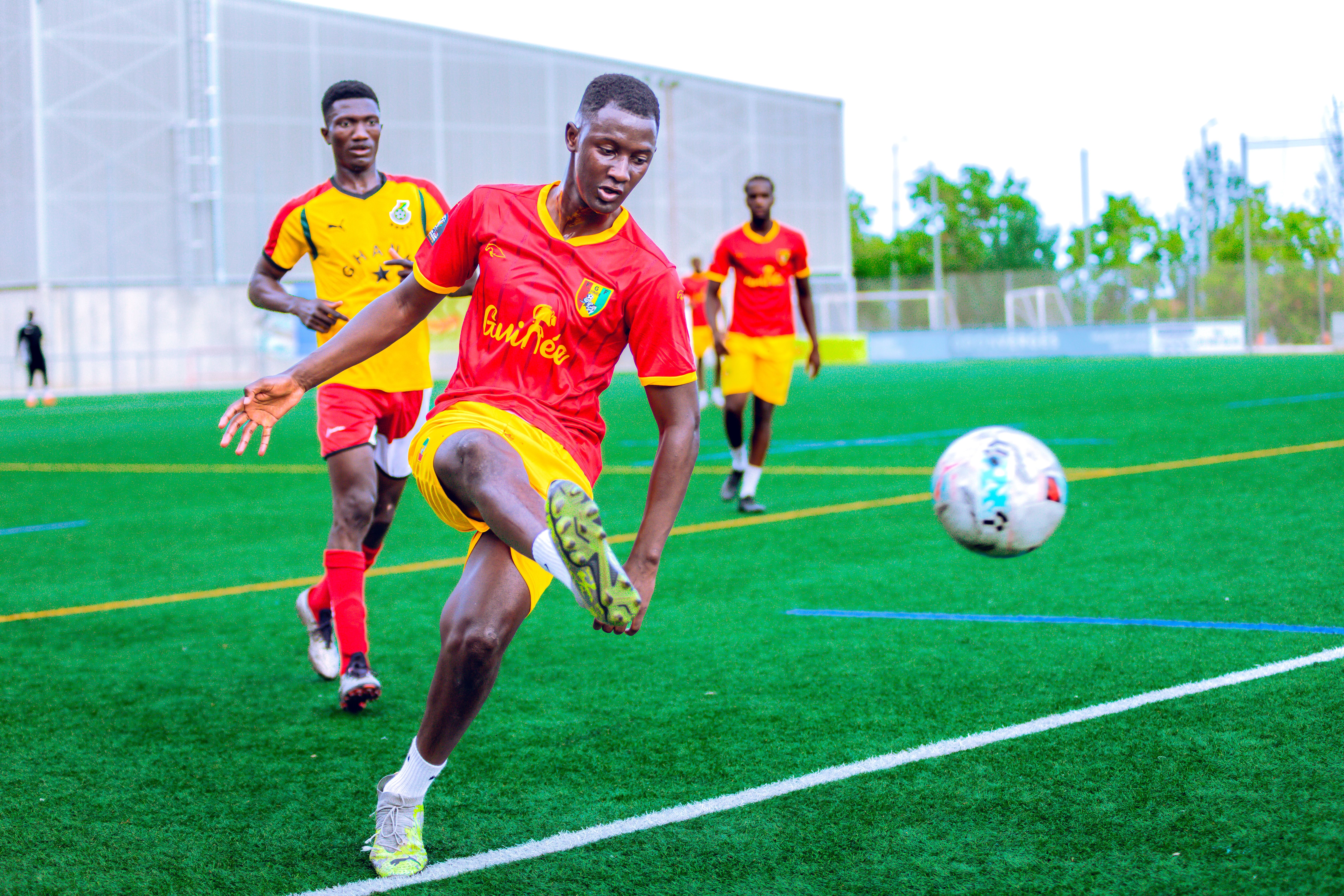 Dynamic Soccer Match on Outdoor Field · Free Stock Photo