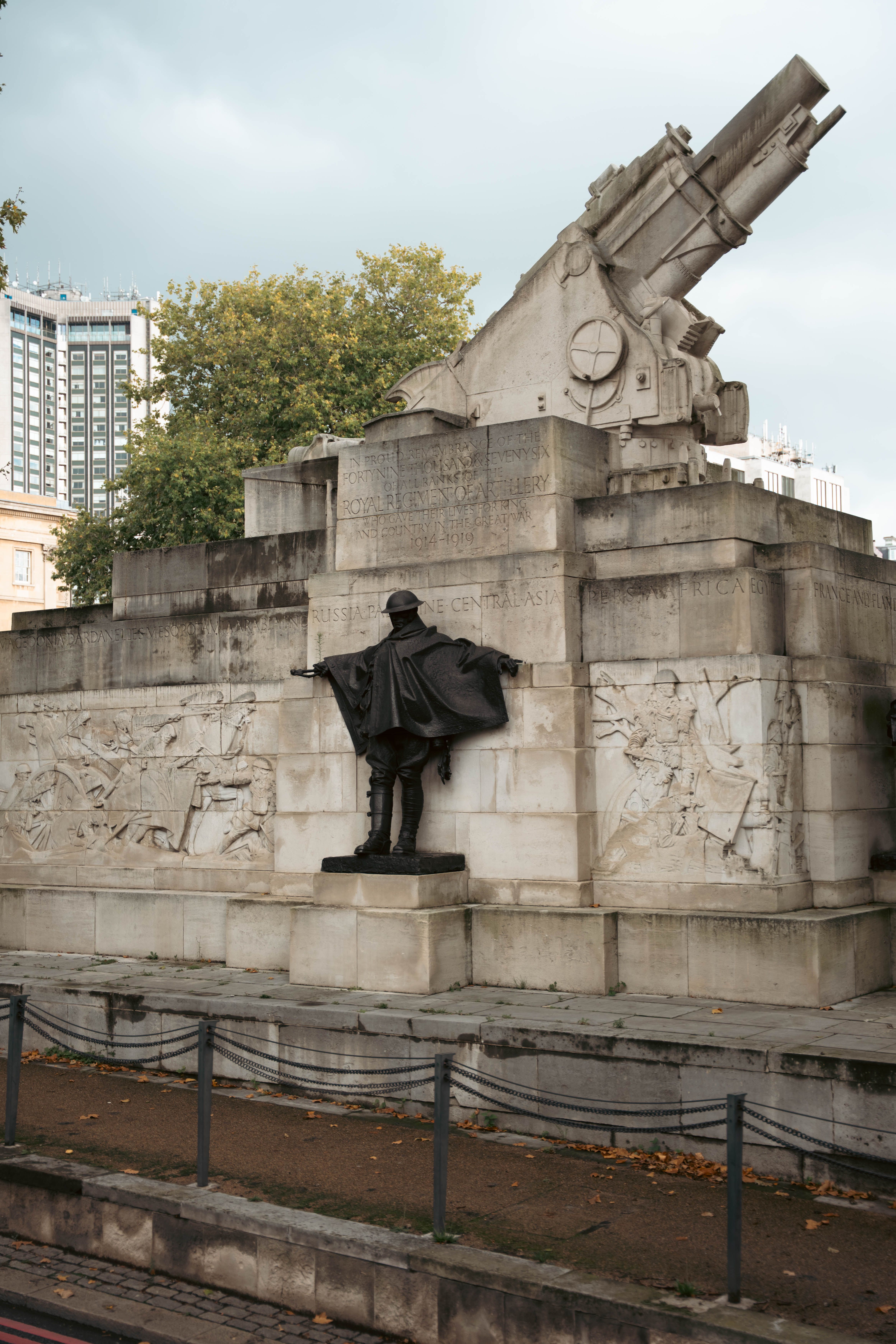 Historic Statue and Cannon Monument in Urban Setting · Free Stock Photo