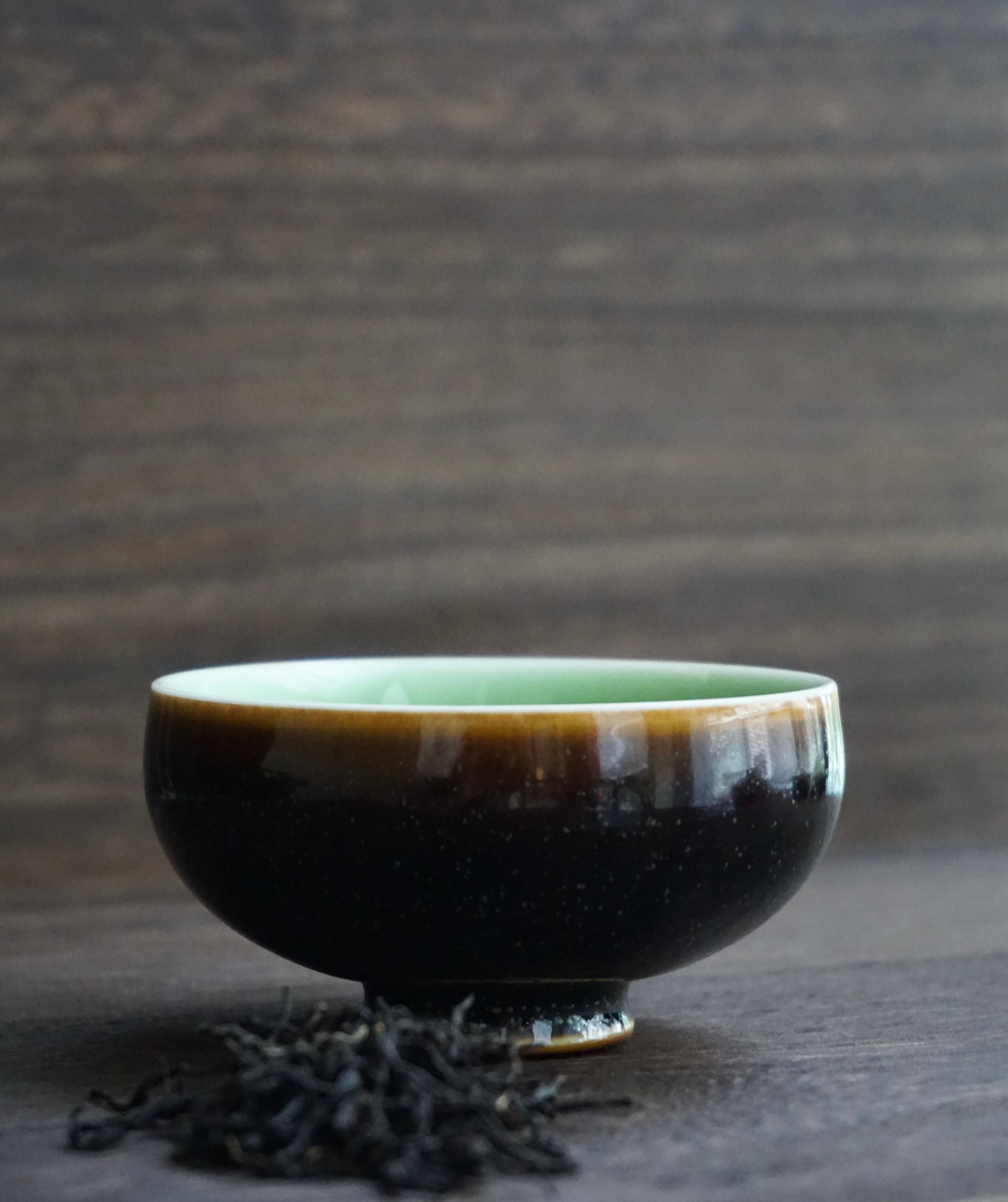 Elegant Ceramic Tea Bowl with Loose Leaf Tea · Free Stock Photo
