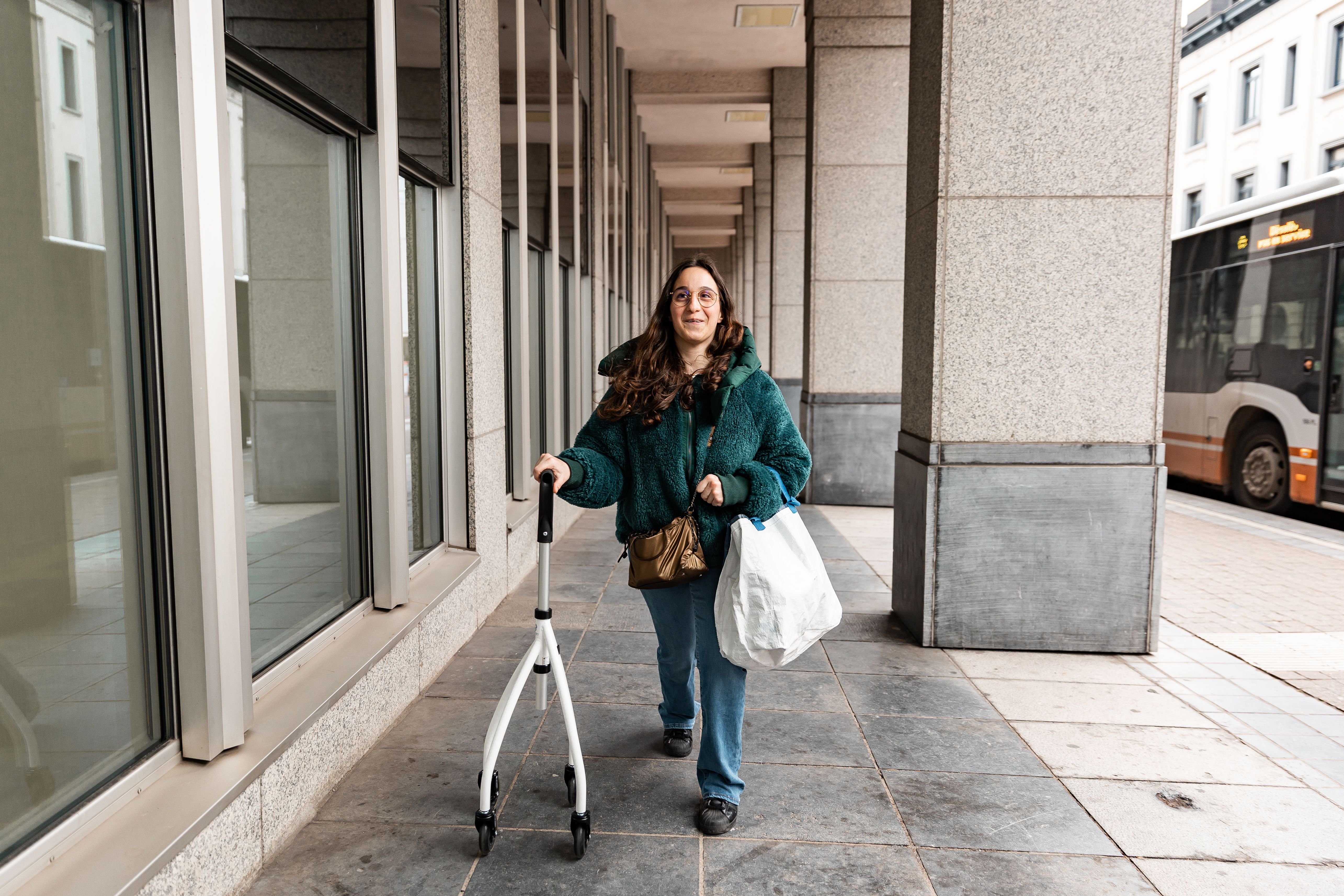 Woman with Rollator Walking in Urban Area · Free Stock Photo