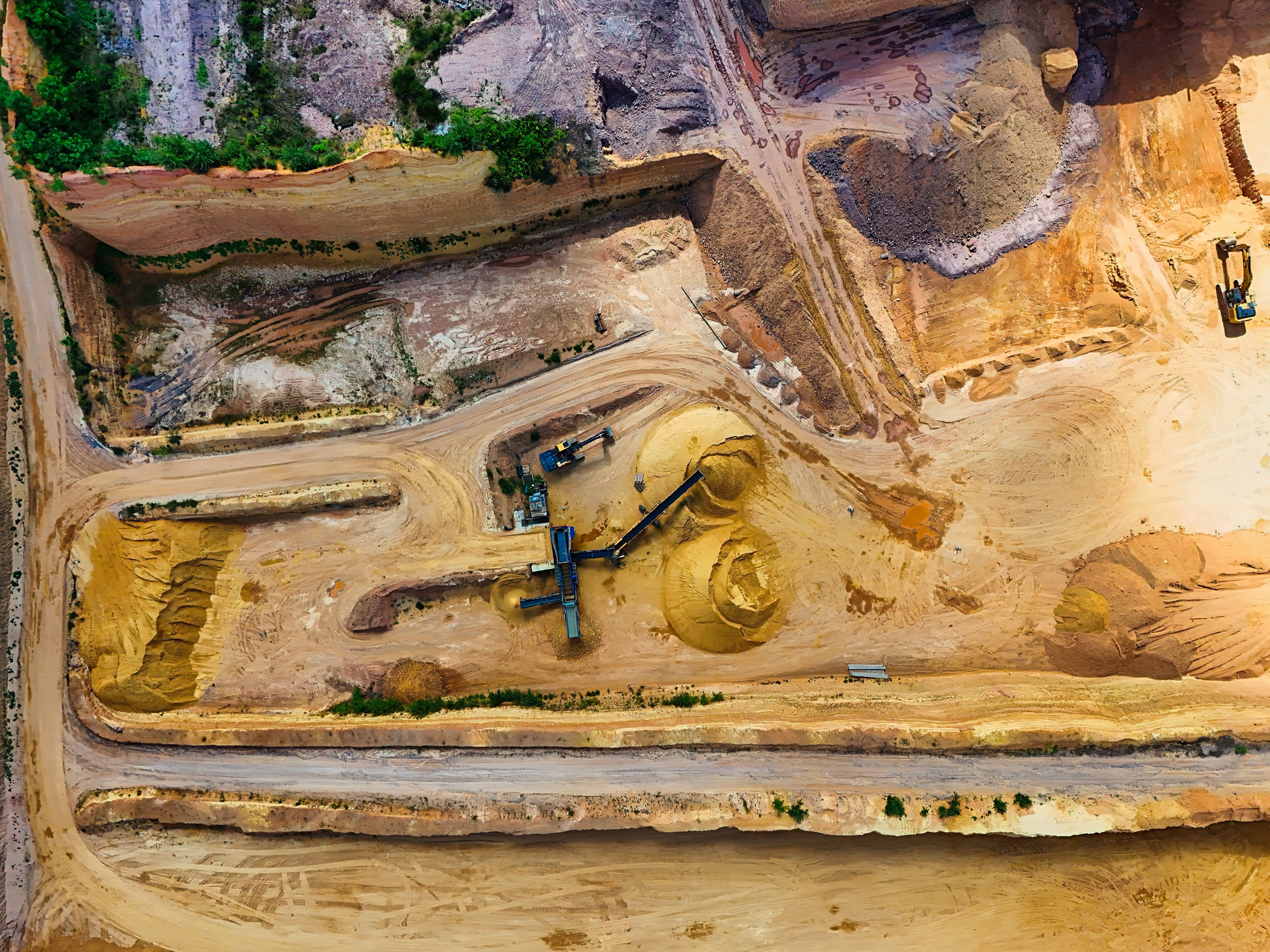 Aerial View of Quarry with Heavy Machinery · Free Stock Photo