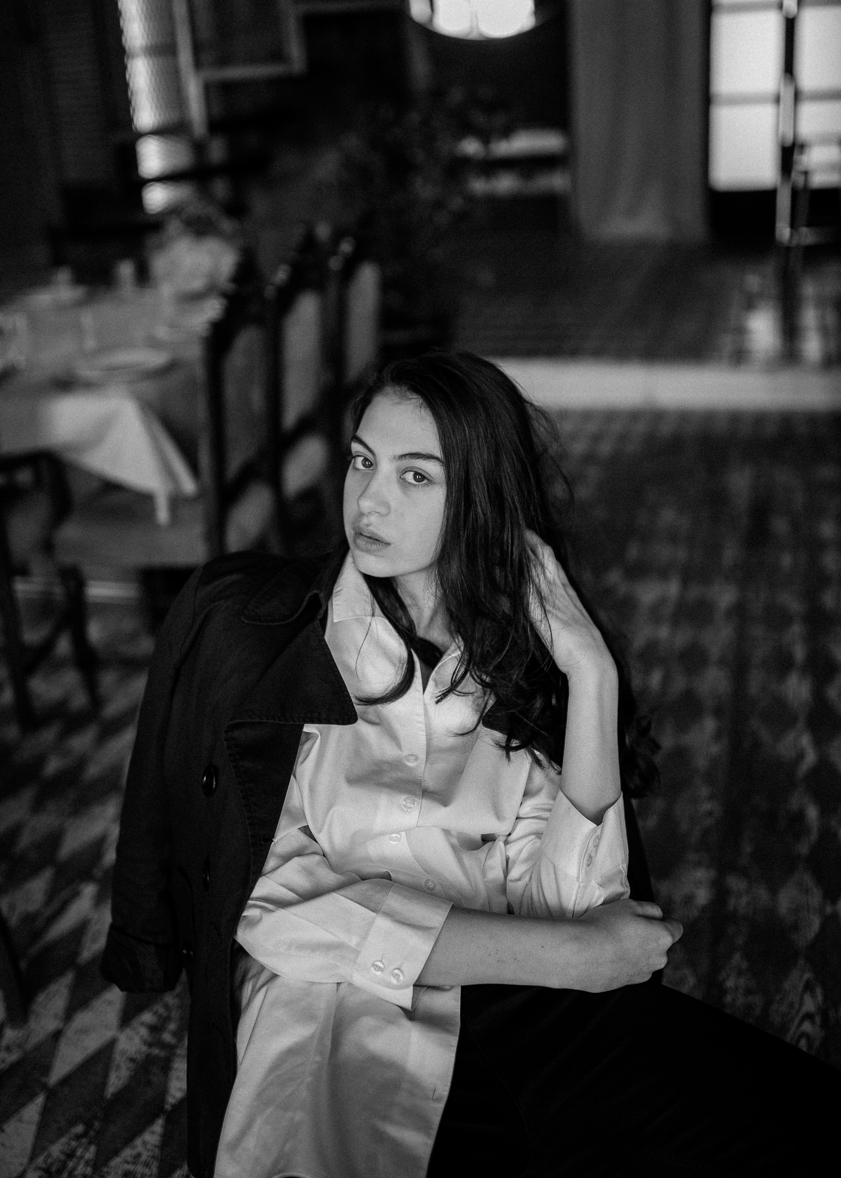 Elegant Monochrome Female Portrait in Artistic Setting · Free Stock Photo
