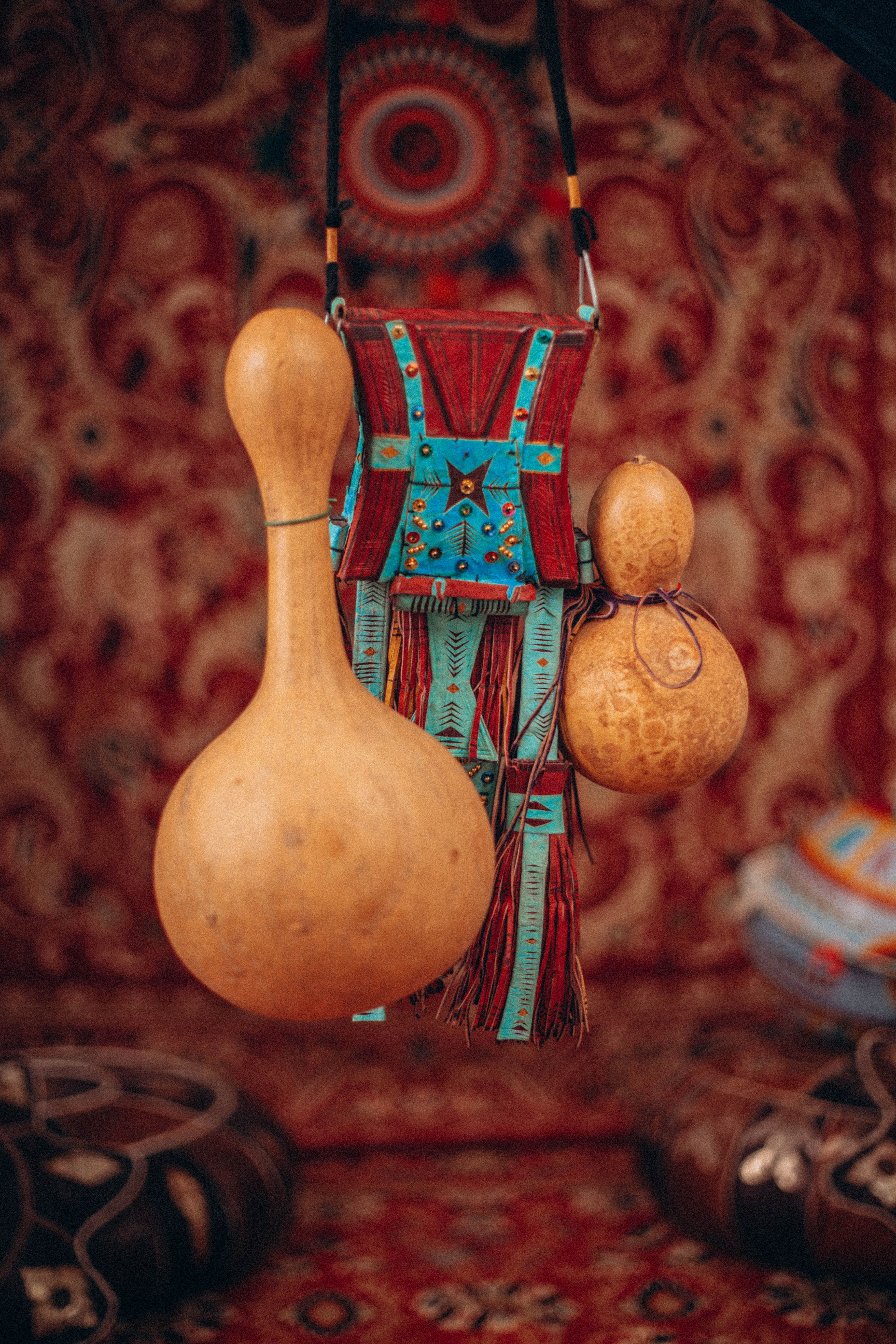 Traditional Decorative Gourds with Tapestry Background · Free Stock Photo