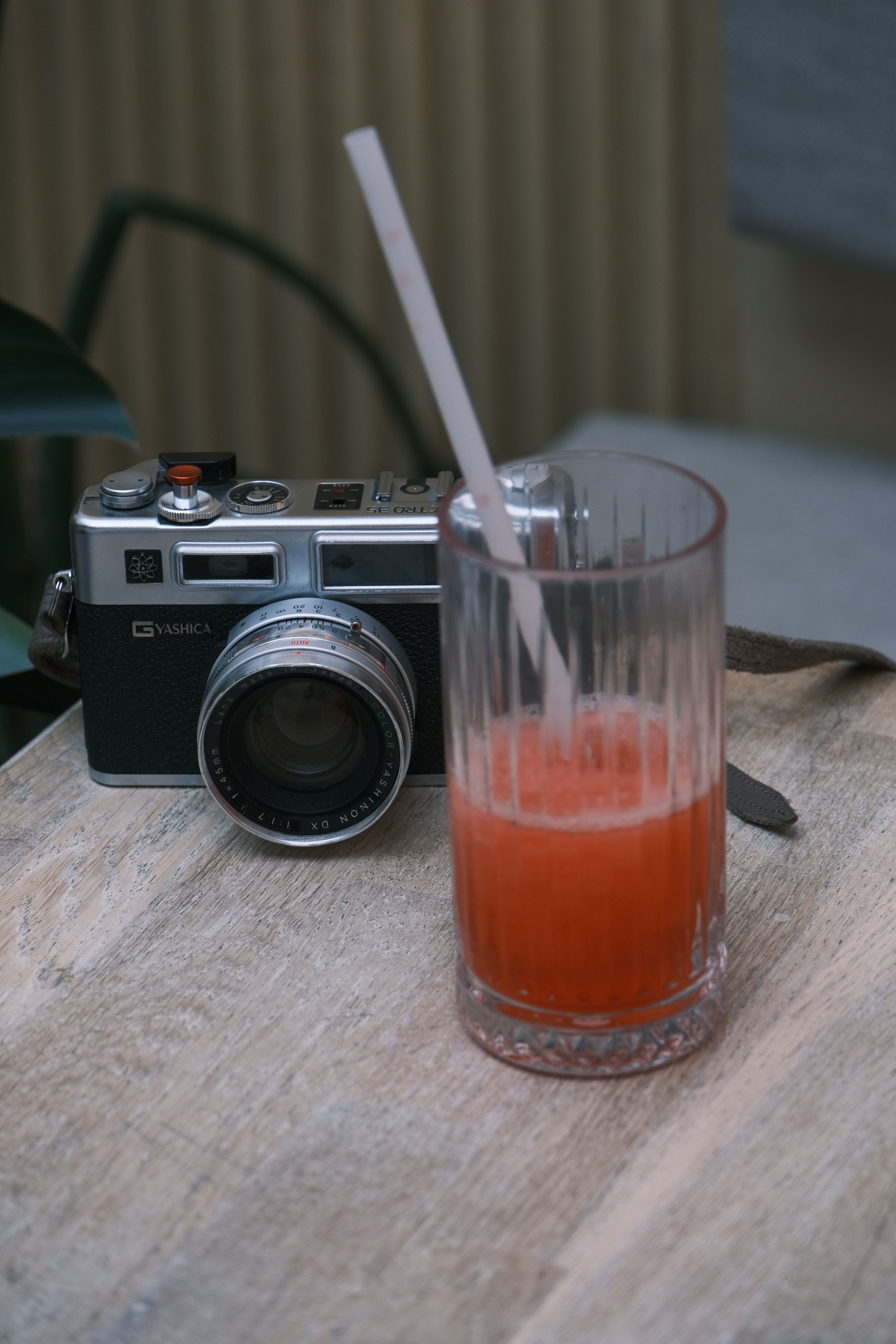 Vintage Camera and Fresh Juice Still Life · Free Stock Photo