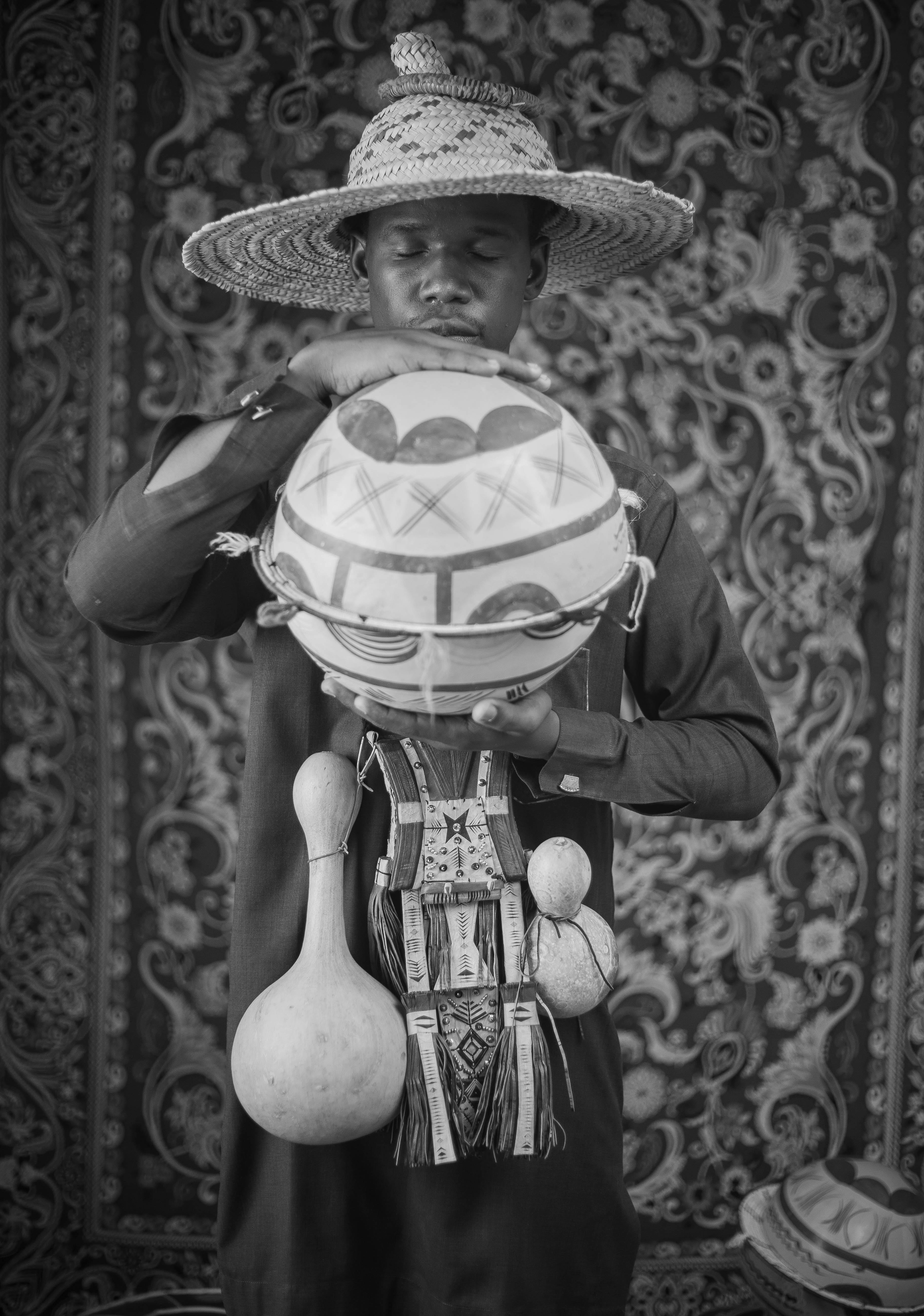 Traditional African Musician Playing Calabash · Free Stock Photo