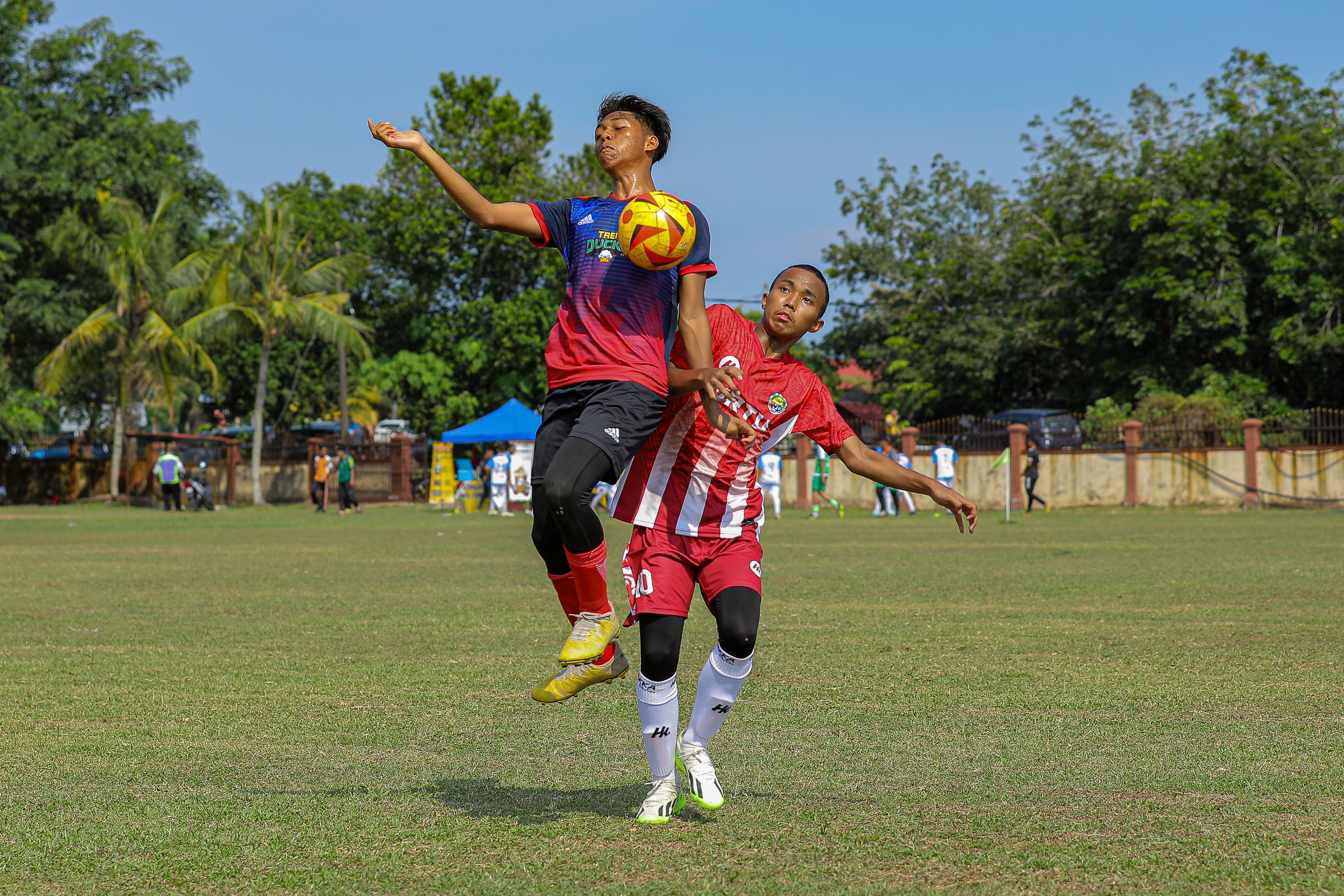 Intense Soccer Match in Outdoor Field · Free Stock Photo