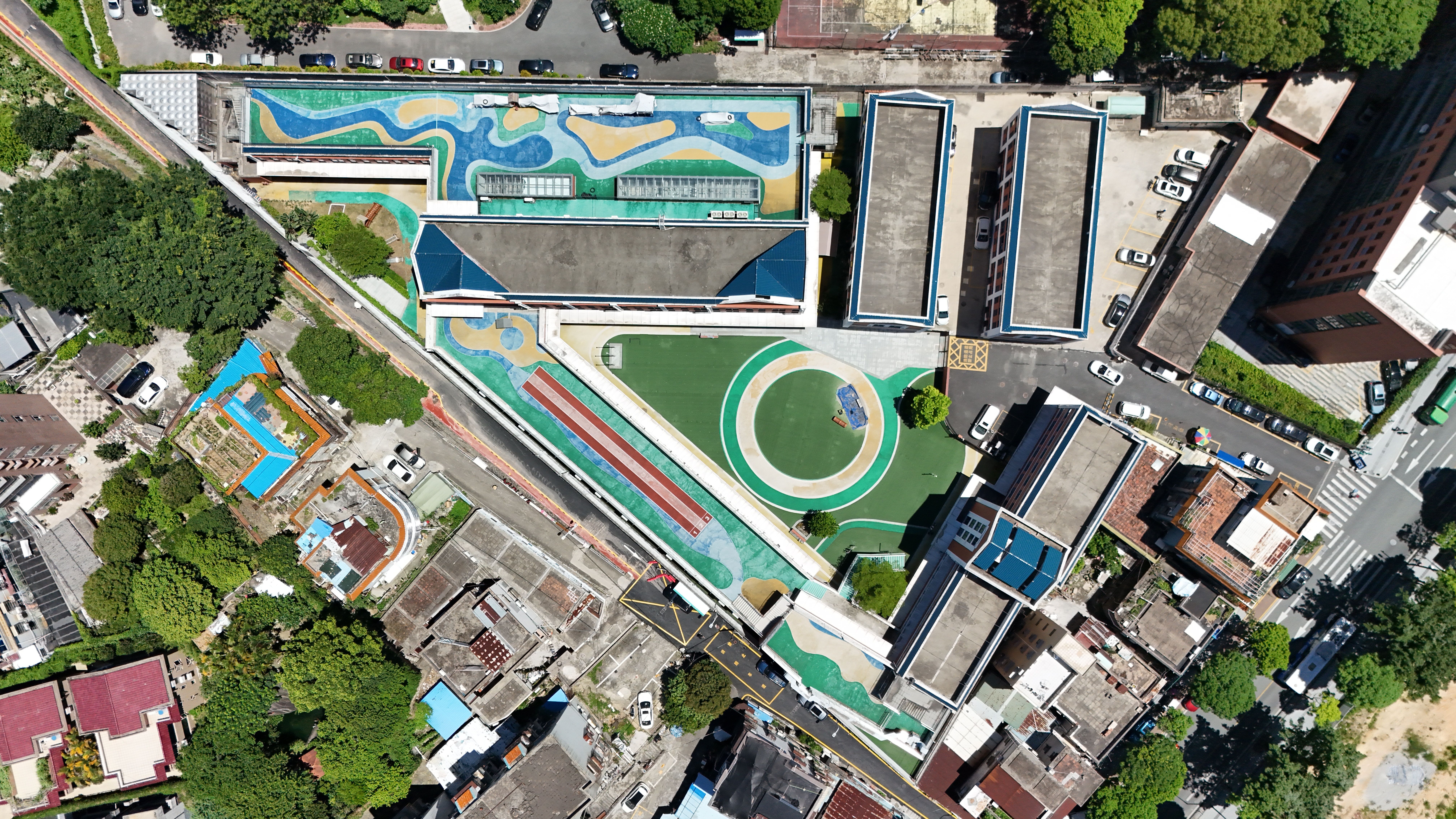 Aerial View of Colorful Urban School Complex · Free Stock Photo