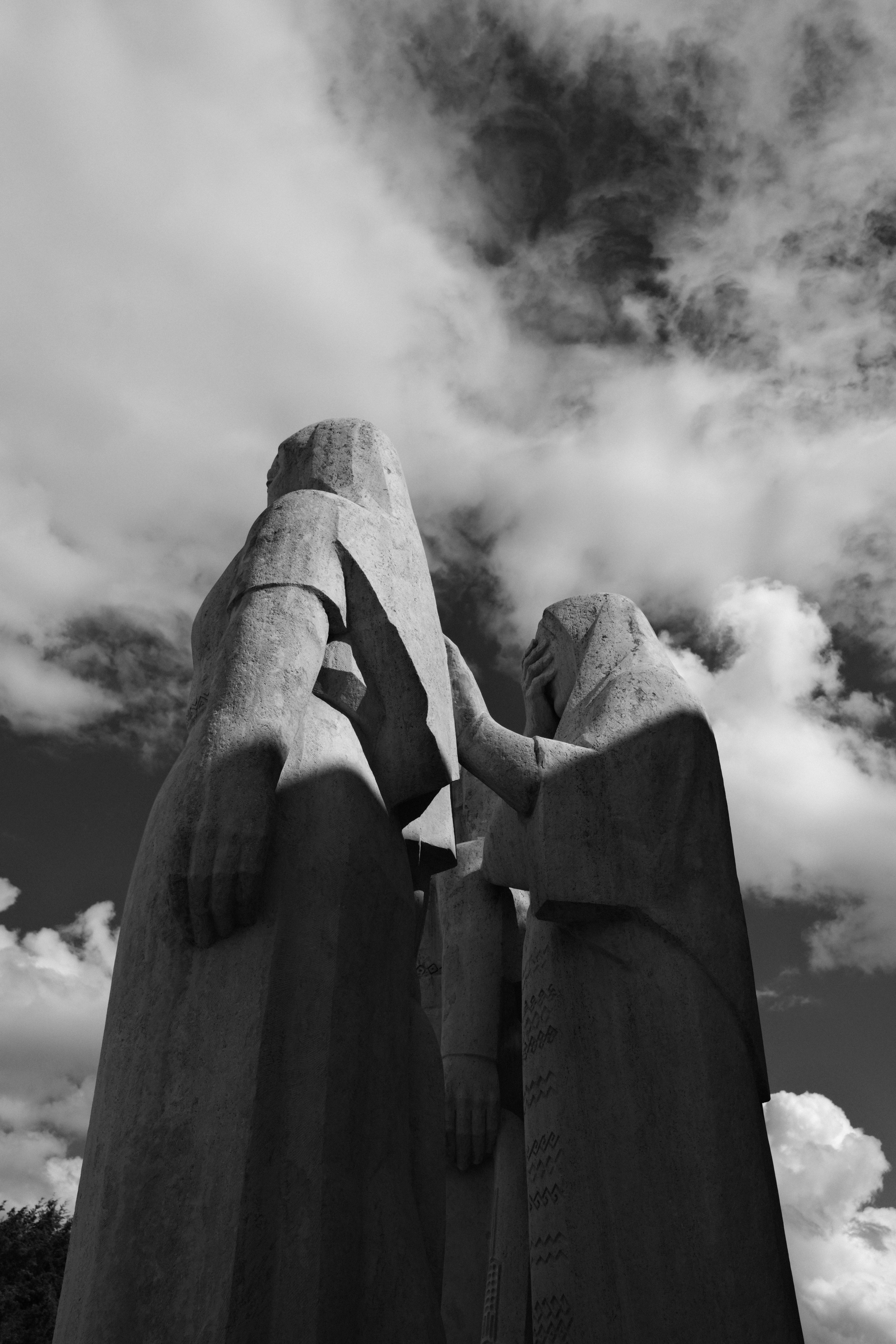 Monumental Stone Statues Against Cloudy Sky in Ankara · Free Stock Photo