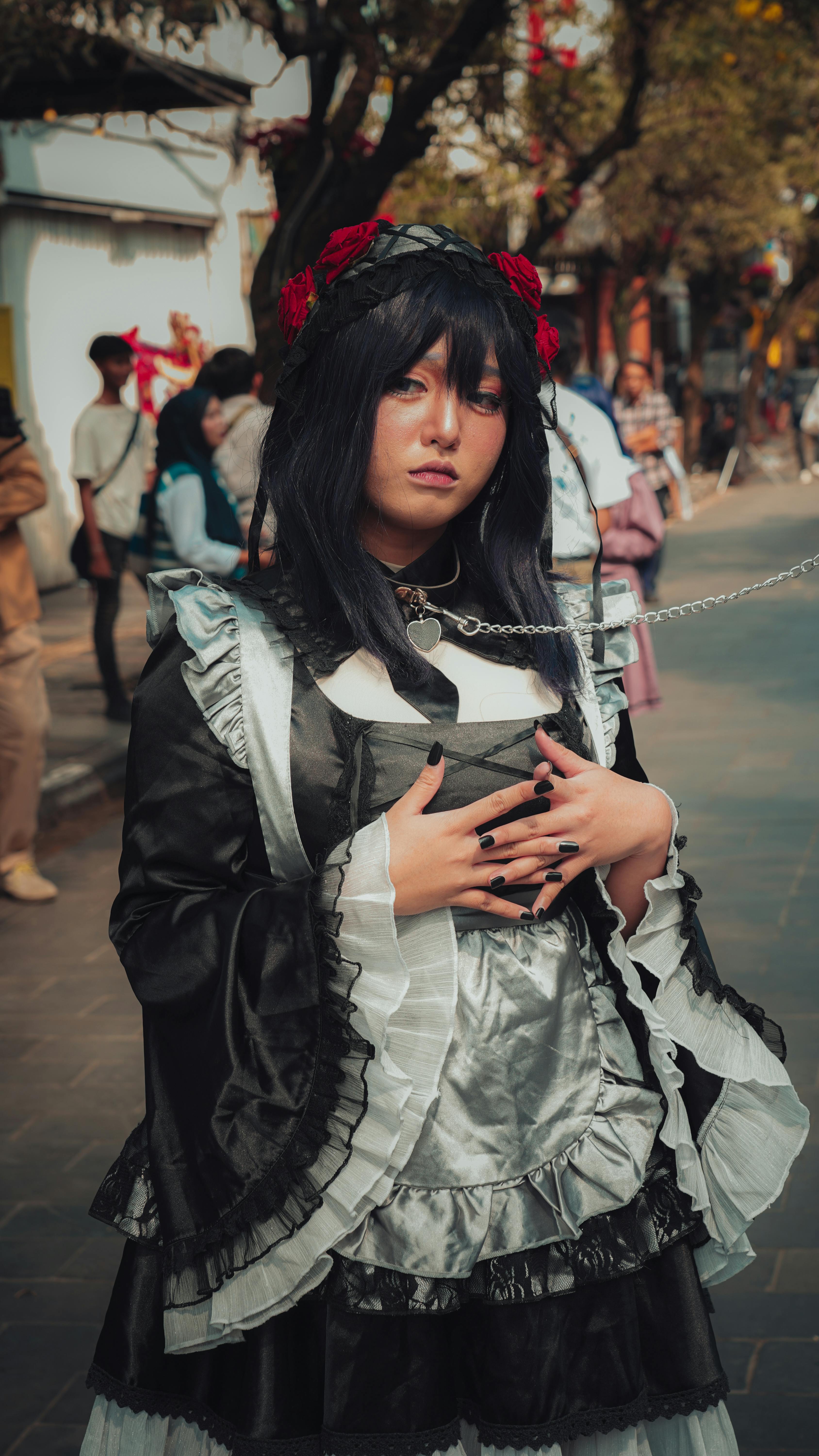 Gothic Lolita Cosplayer in Urban Street Setting · Free Stock Photo