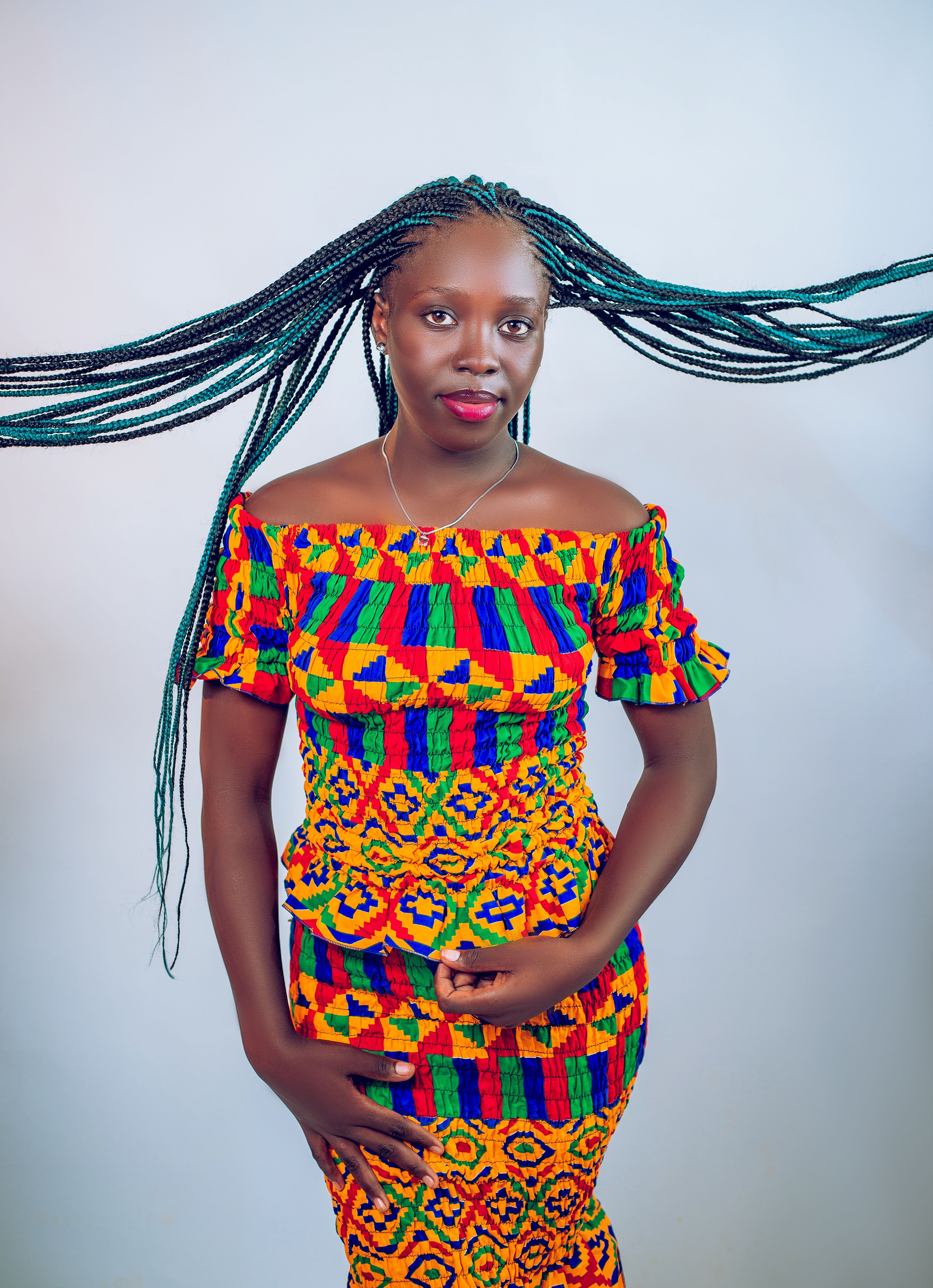 Colorful Traditional Attire and Braids in Niger · Free Stock Photo