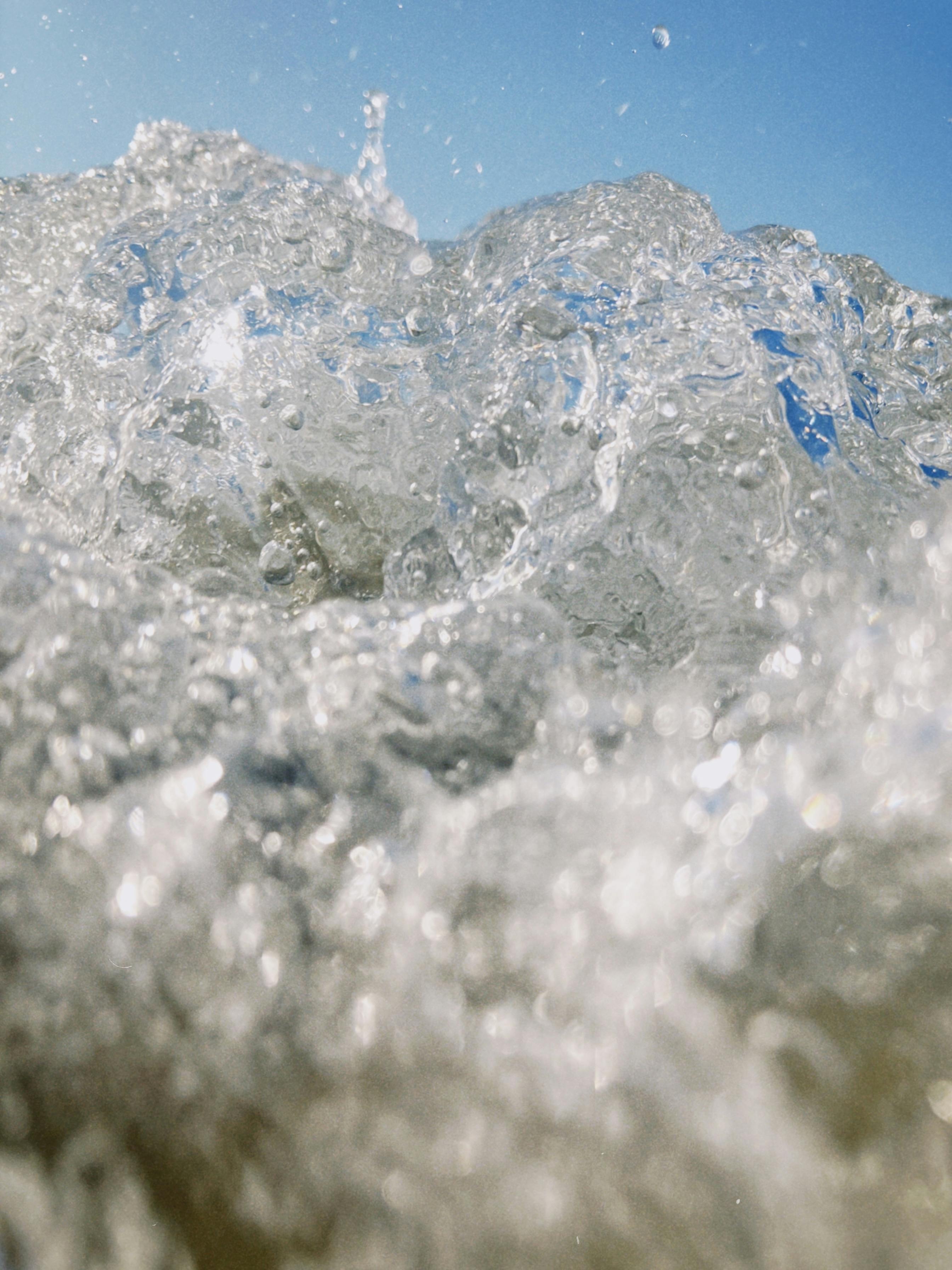 Close-up of Splashing Ocean Wave During Daytime · Free Stock Photo