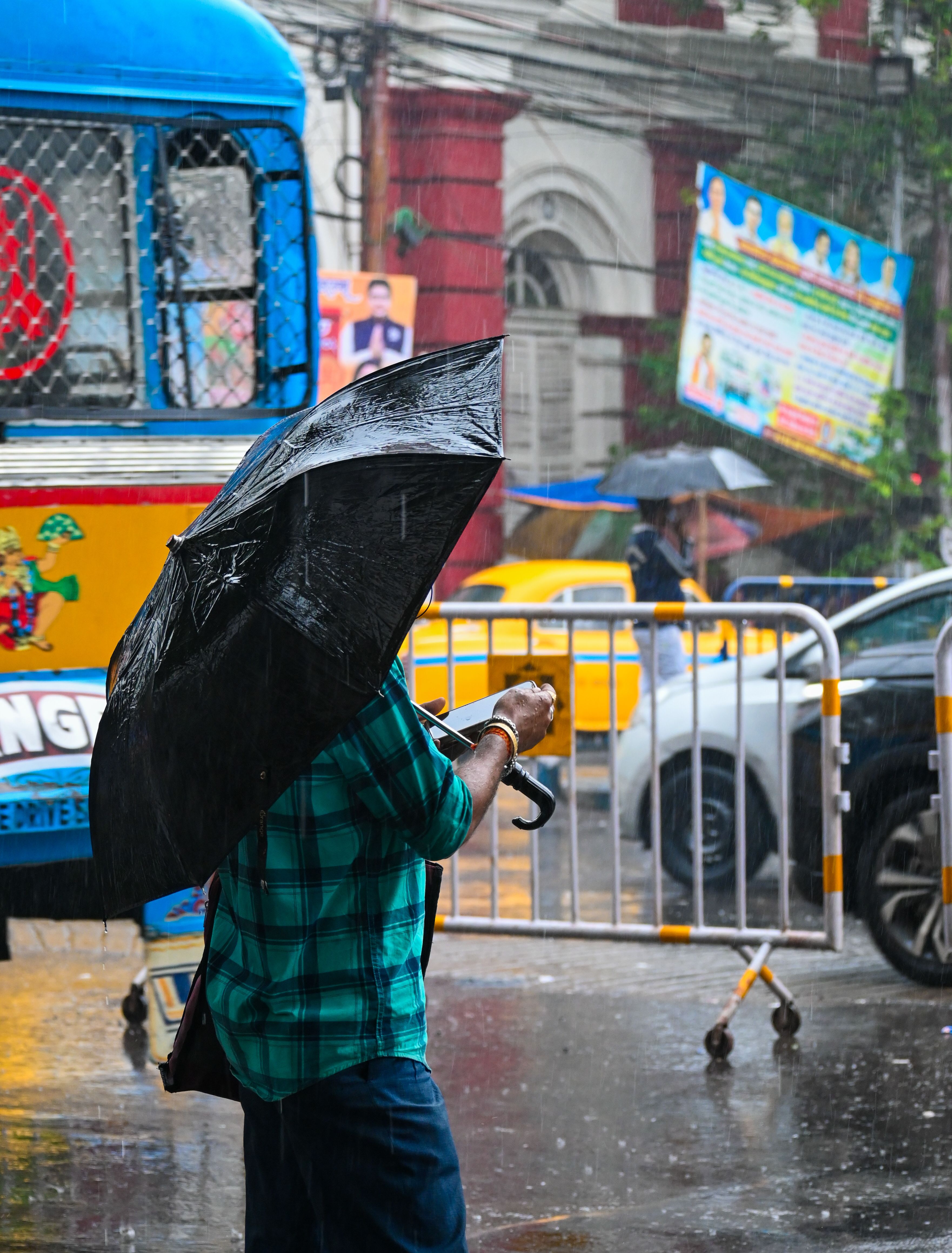 Rainy Day Street Scene with Umbrella · Free Stock Photo