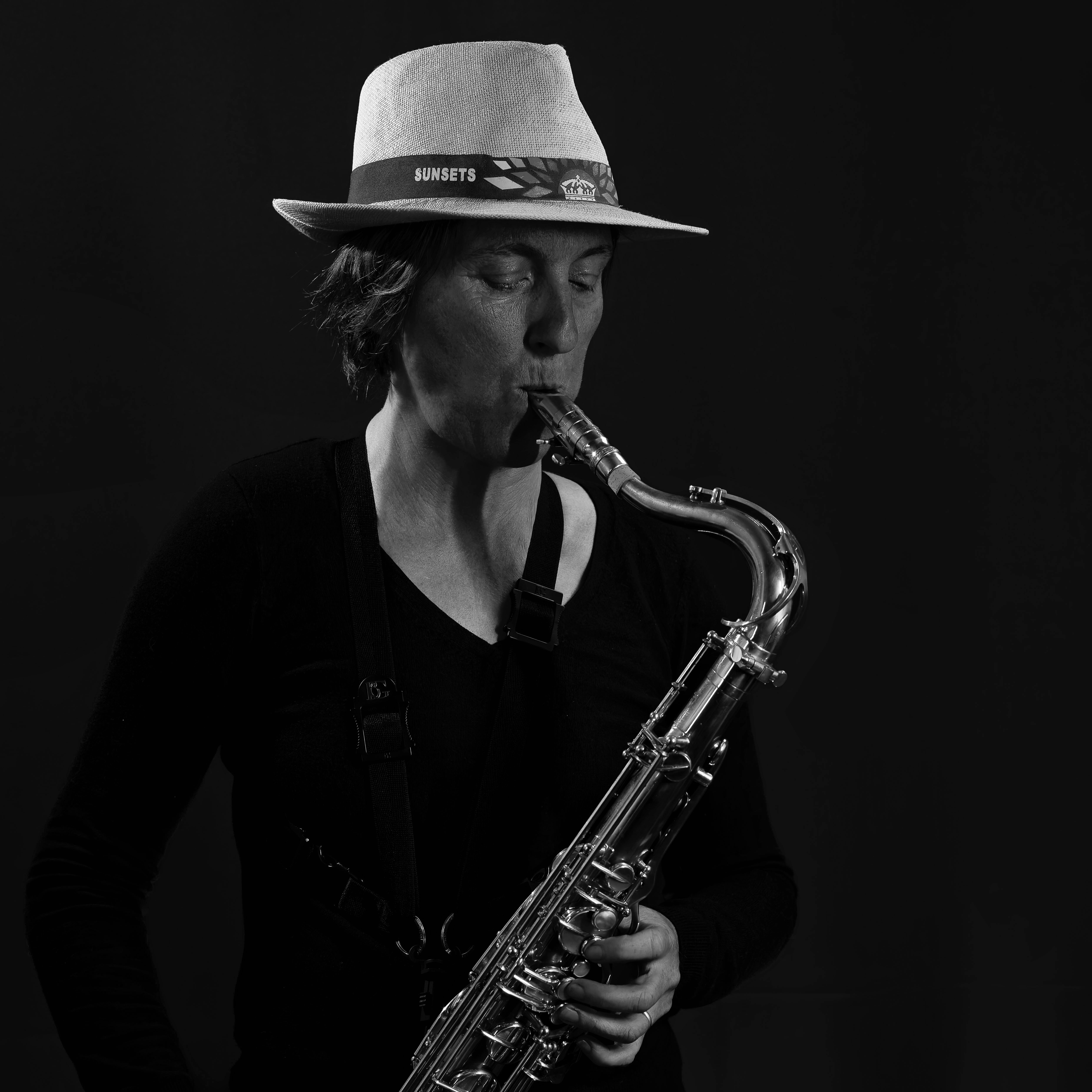 Black and White Portrait of Saxophone Player · Free Stock Photo