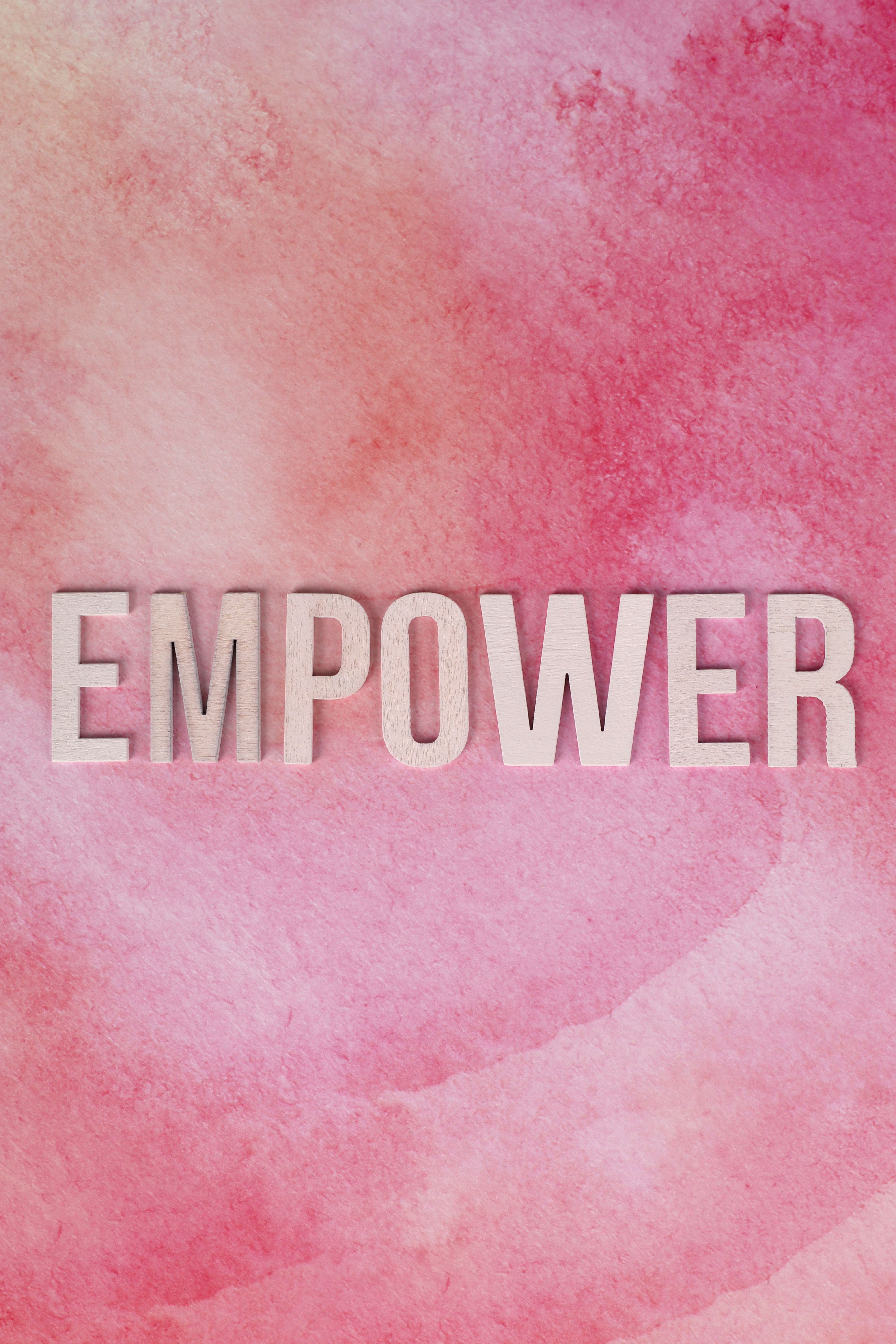 Empowerment Concept with Pink Watercolor Background · Free Stock Photo