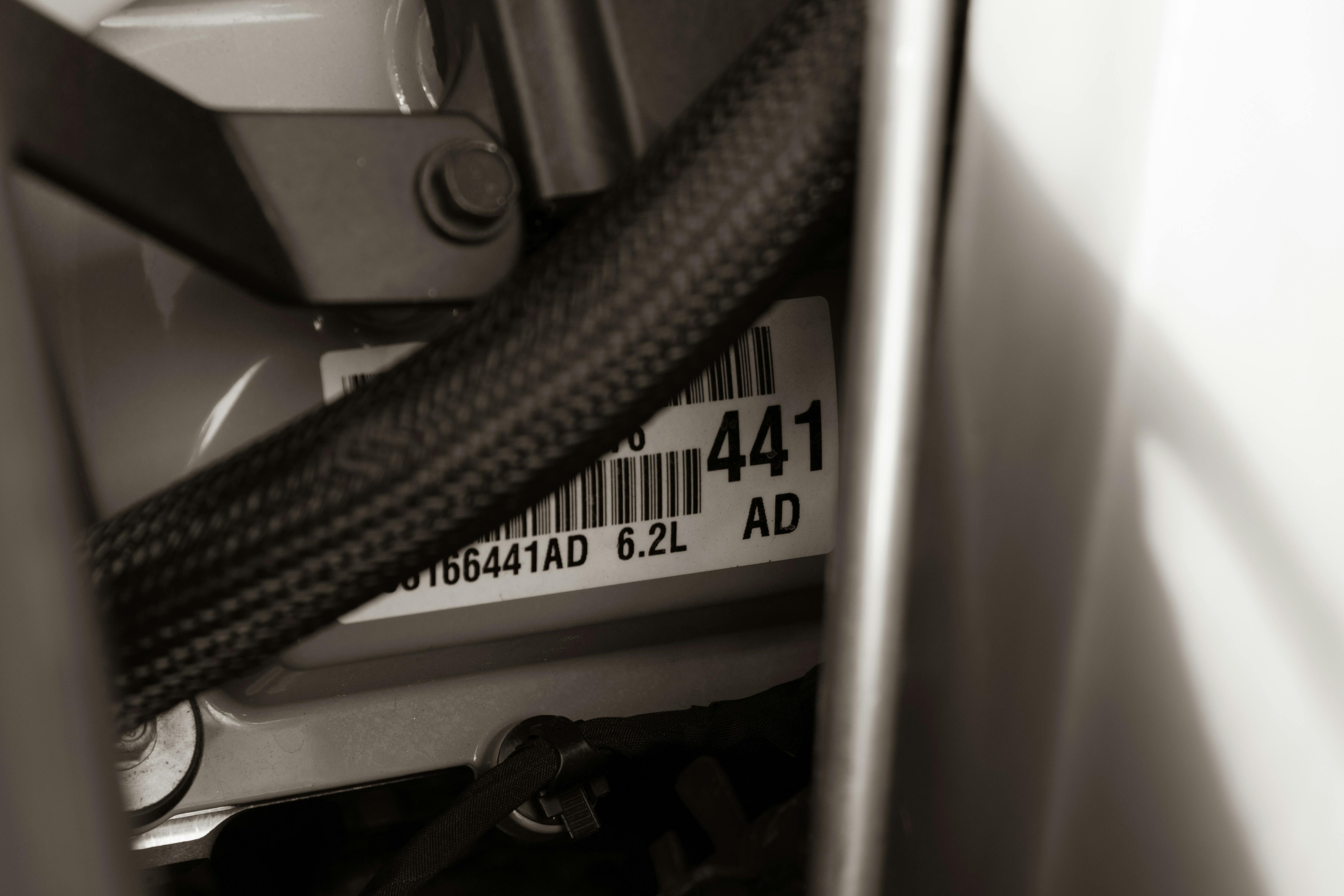 Free stock photo of black and white, build plate, engine tag