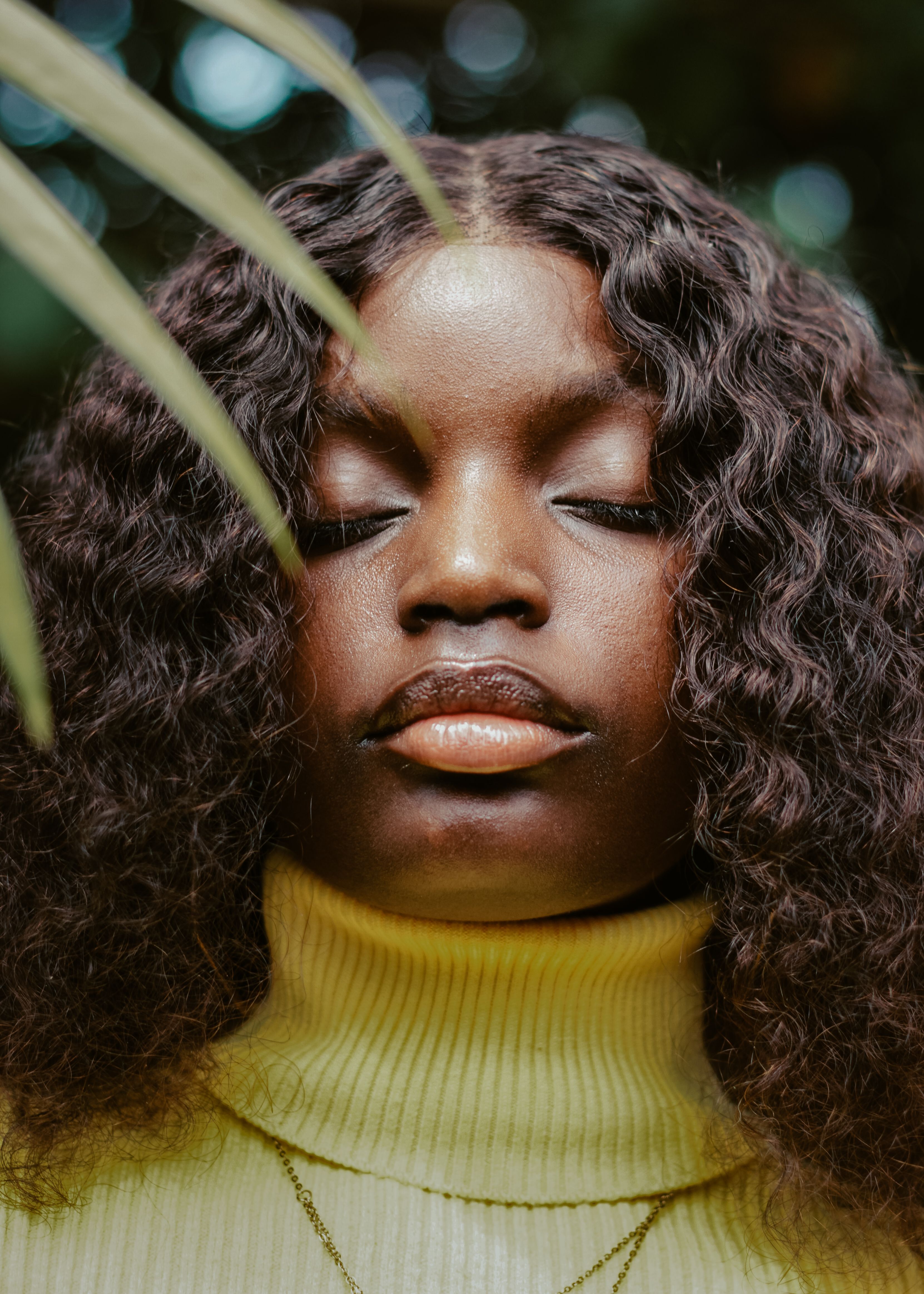 Serene Portrait of a Woman in Nature Setting · Free Stock Photo
