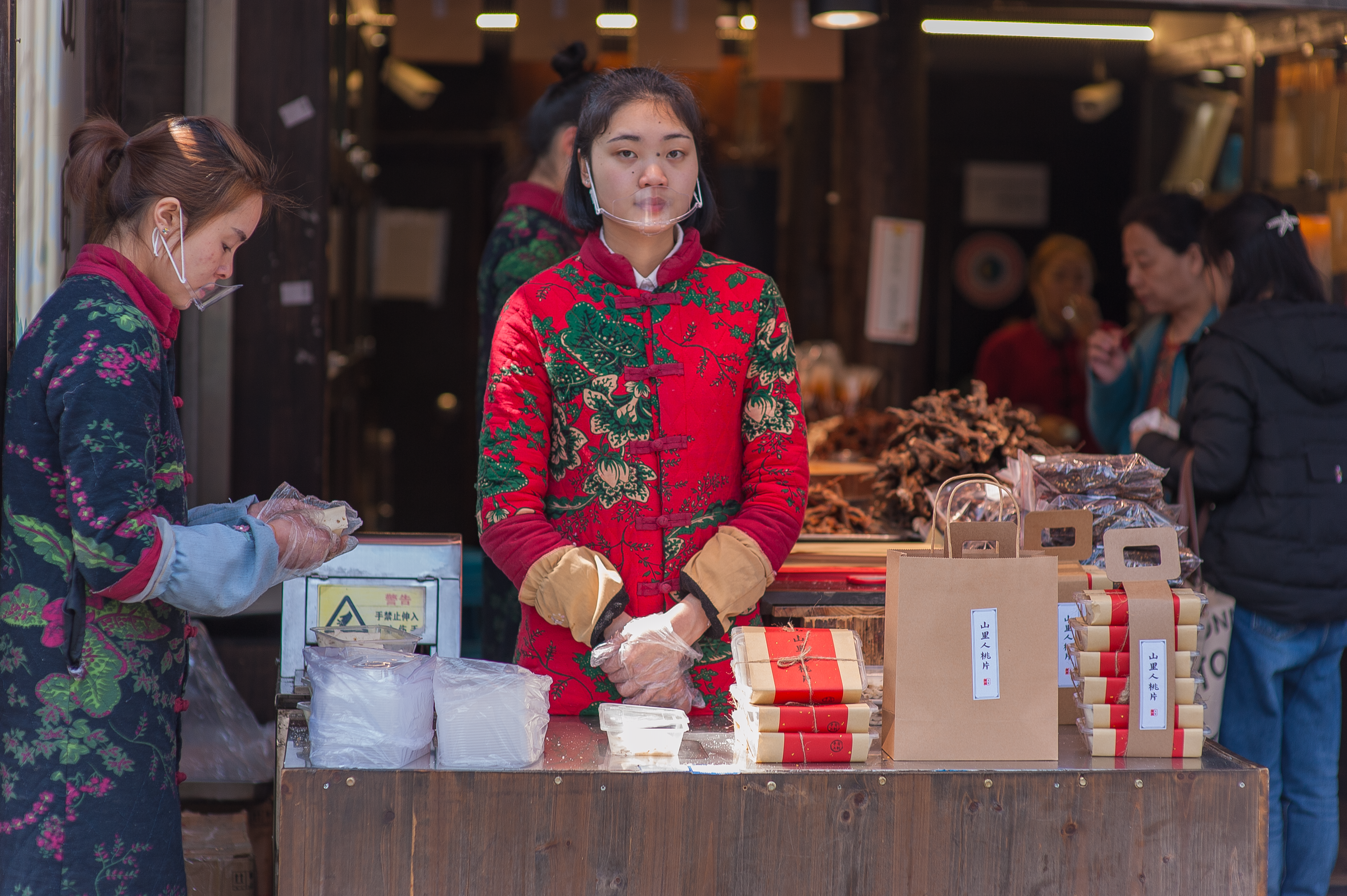 Traditional Market with Vendors in Vibrant Dress · Free Stock Photo