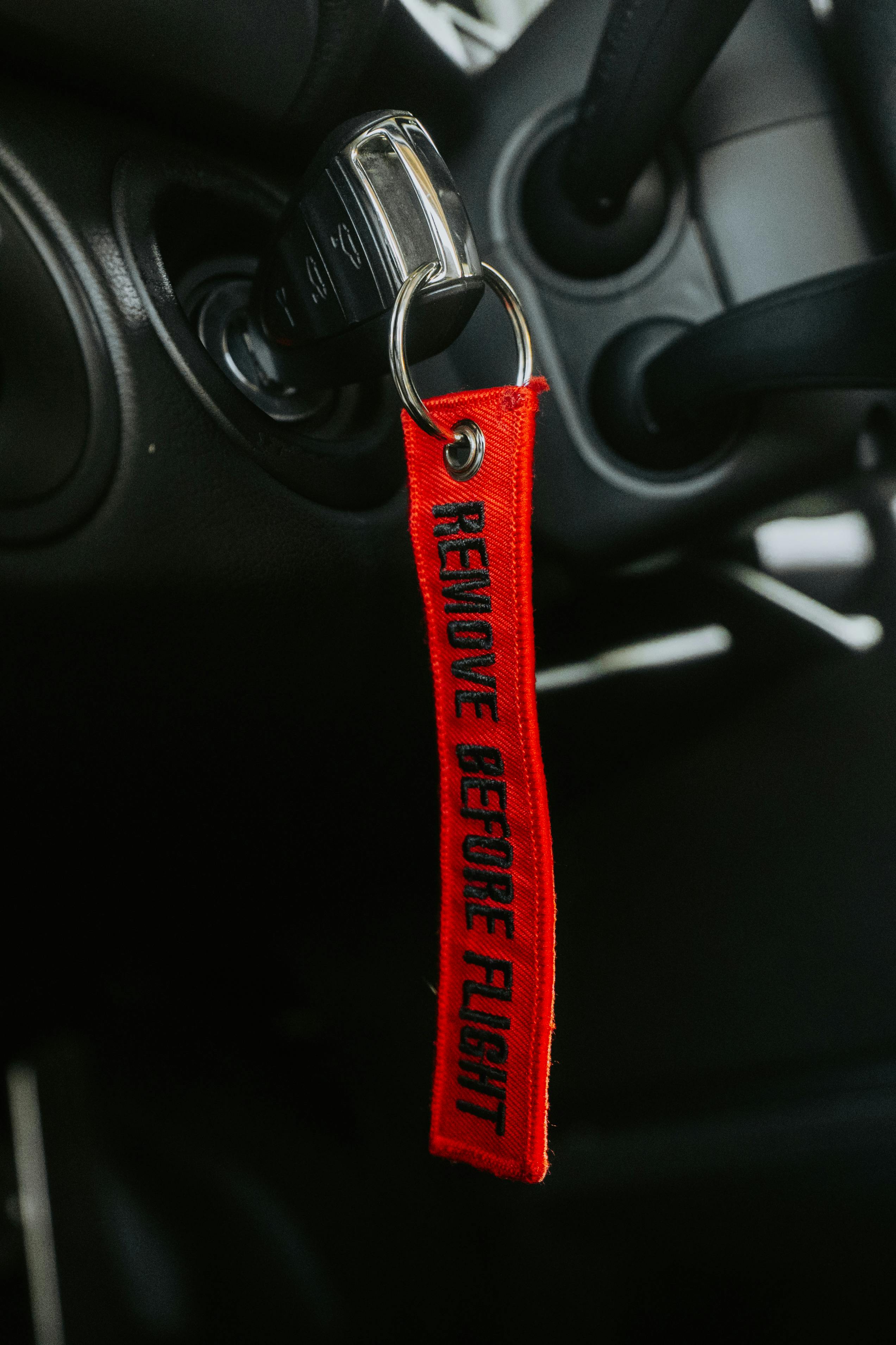 Close-up of Key with Remove Before Flight Tag · Free Stock Photo
