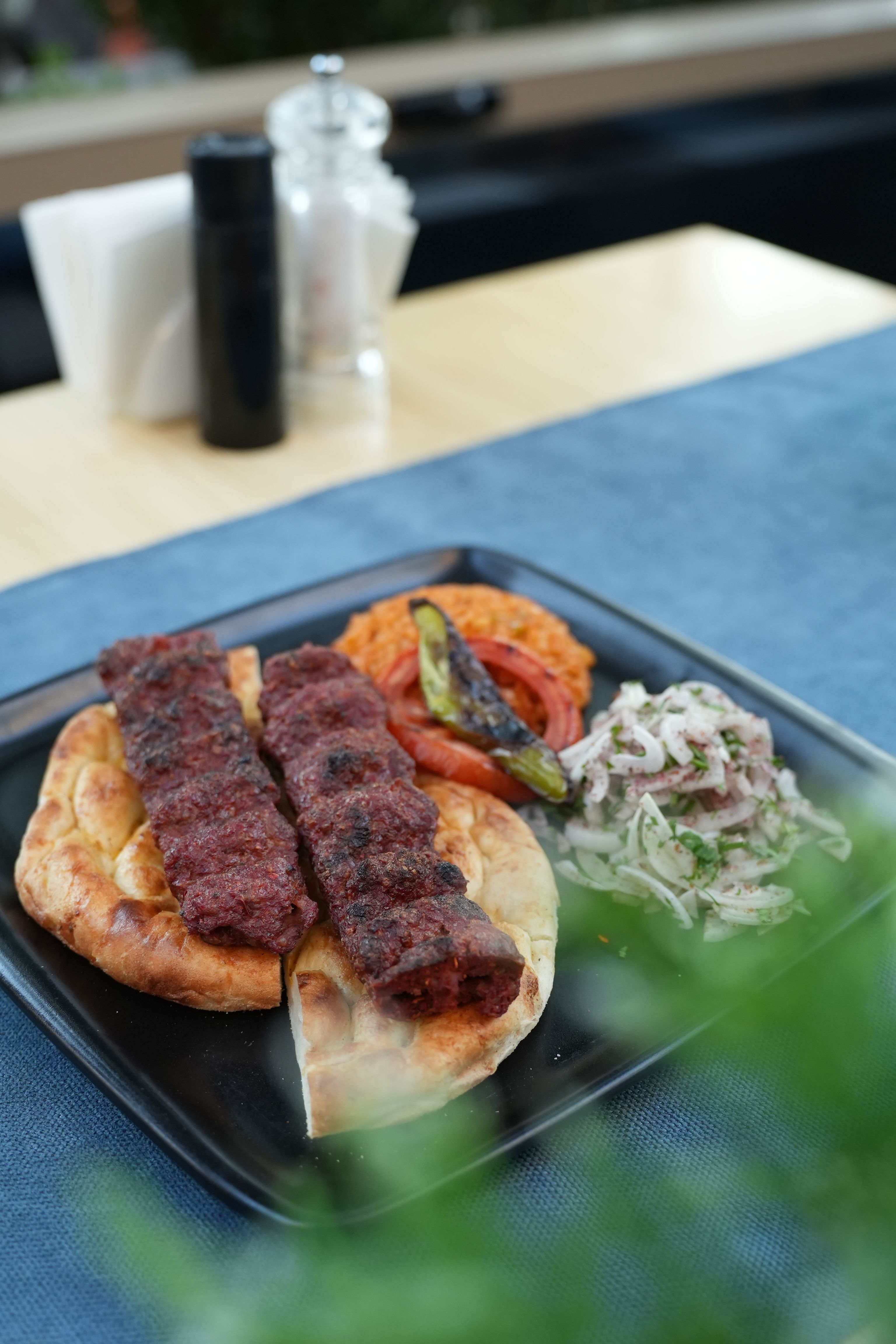 Delicious Turkish Kebab Platter on Pita Bread · Free Stock Photo