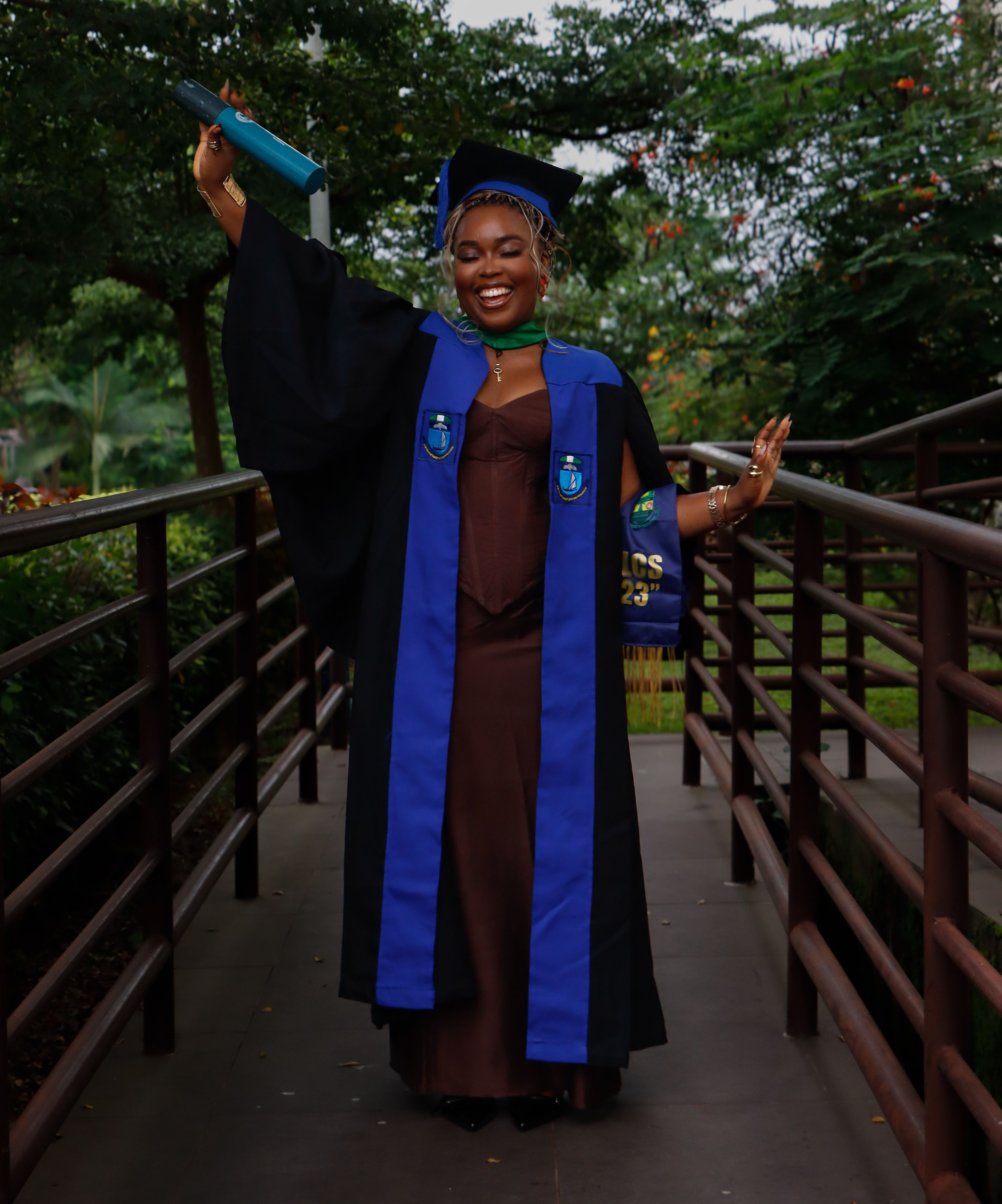 Joyful Graduation Celebration Outdoors · Free Stock Photo
