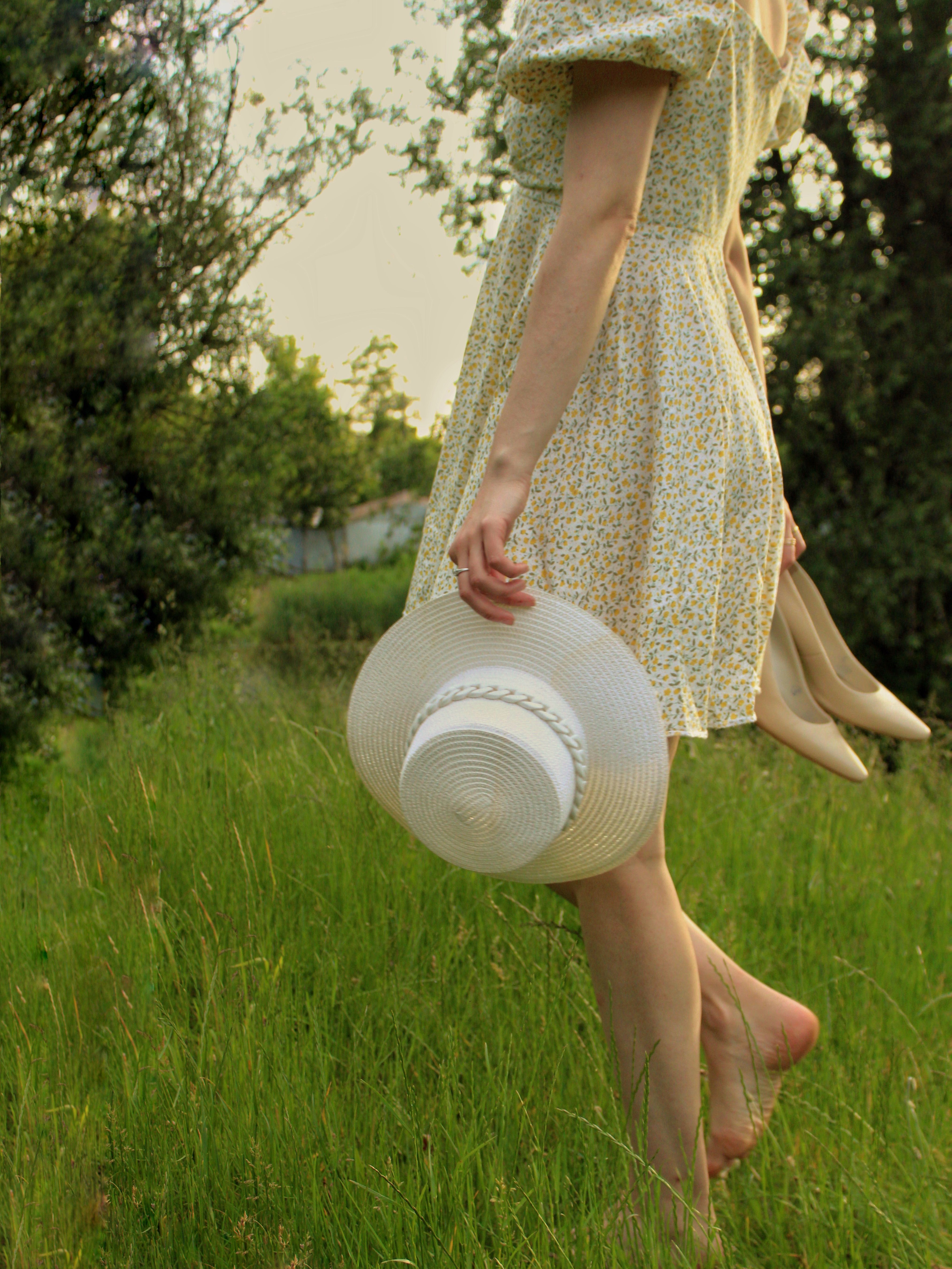 Woman Enjoying a Peaceful Summer Walk in Nature · Free Stock Photo