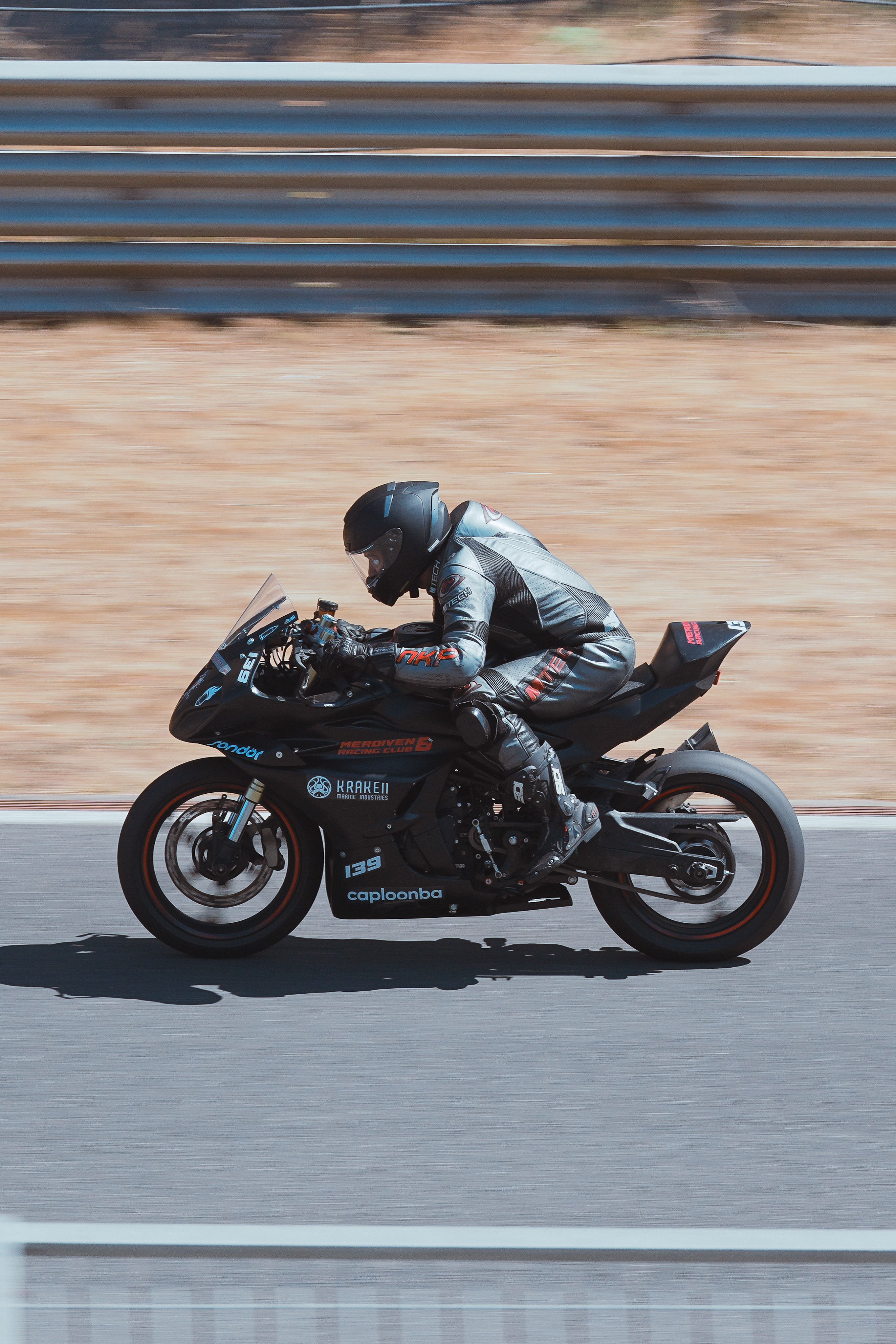 High-speed Motorcycle Racing on Clear Day · Free Stock Photo